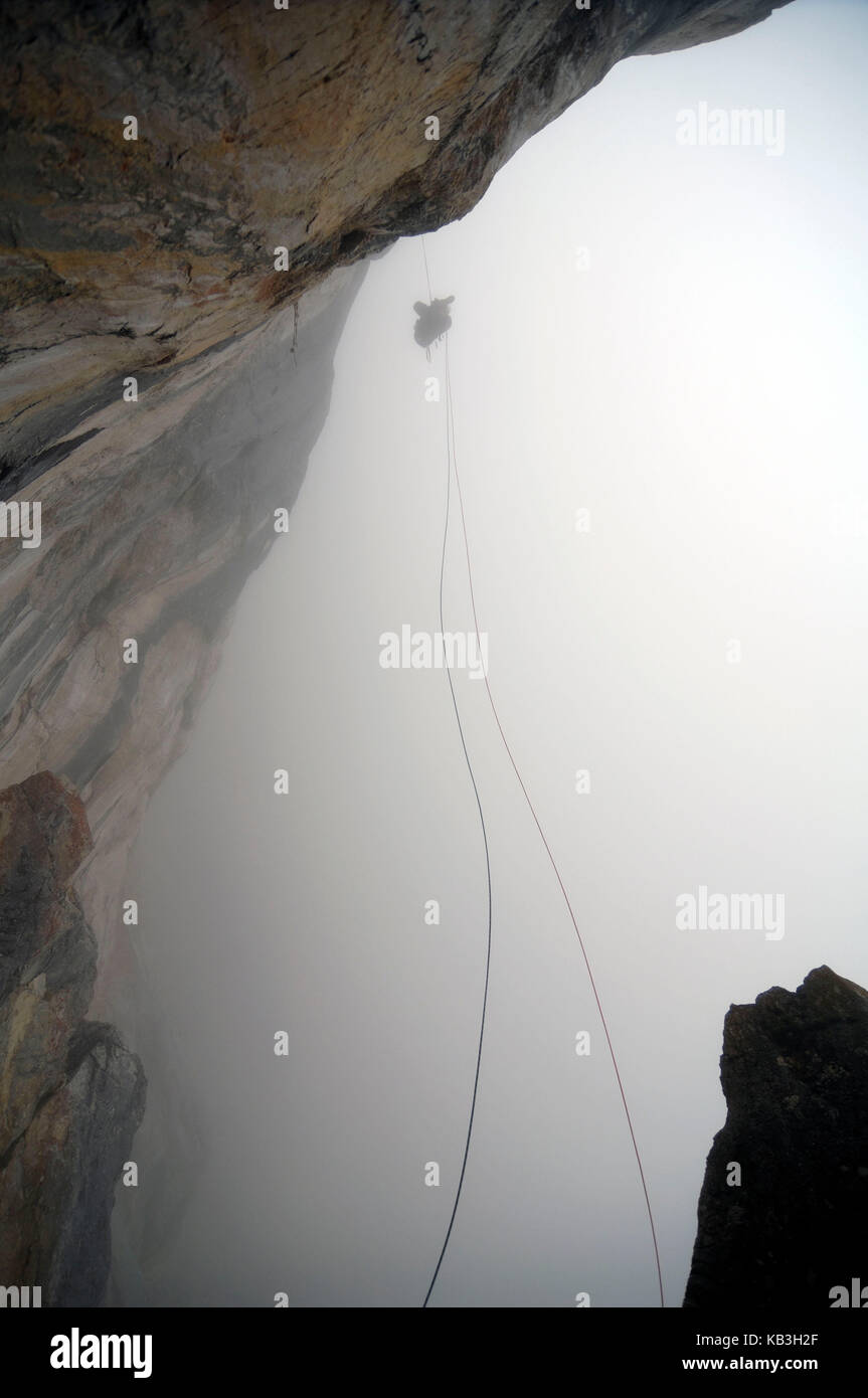 Climber while rappeling Stock Photo - Alamy