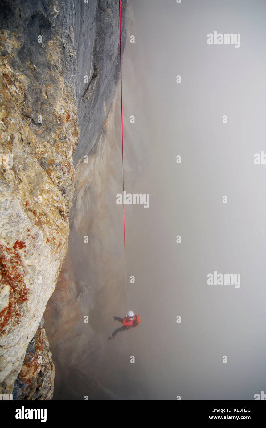 Climber while rappeling Stock Photo - Alamy