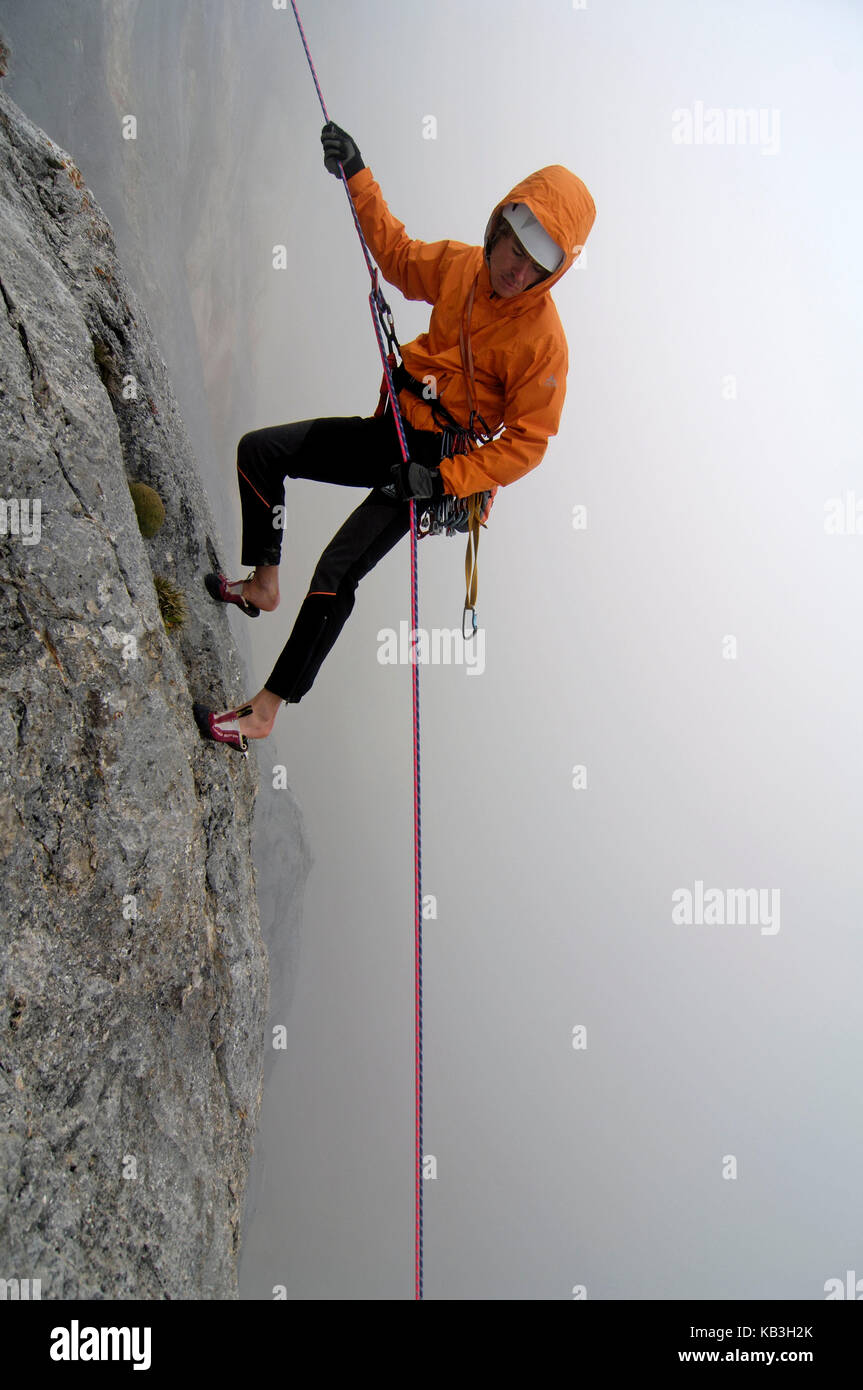 Climber while rappeling Stock Photo - Alamy