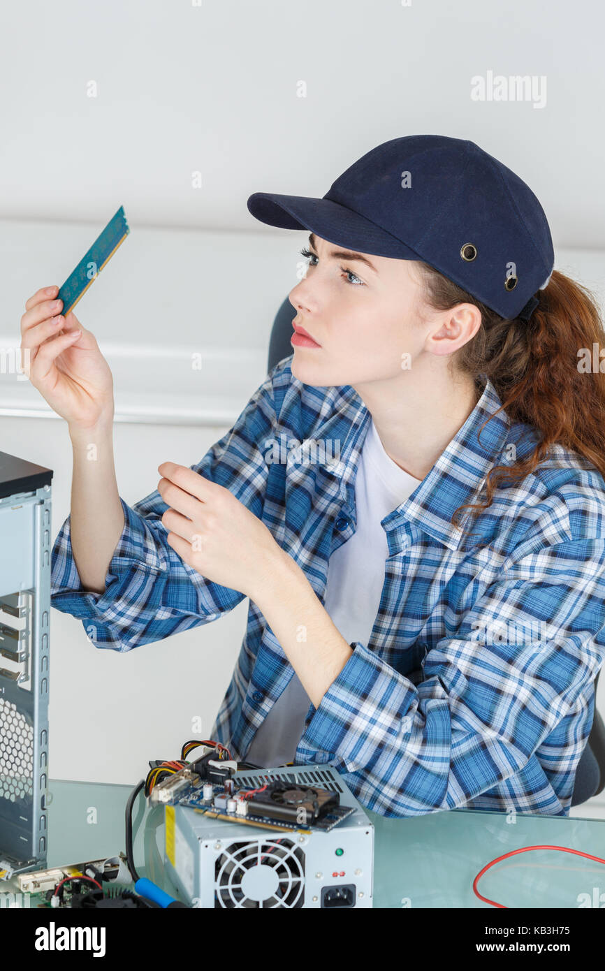 female technician working with transistor Stock Photo - Alamy