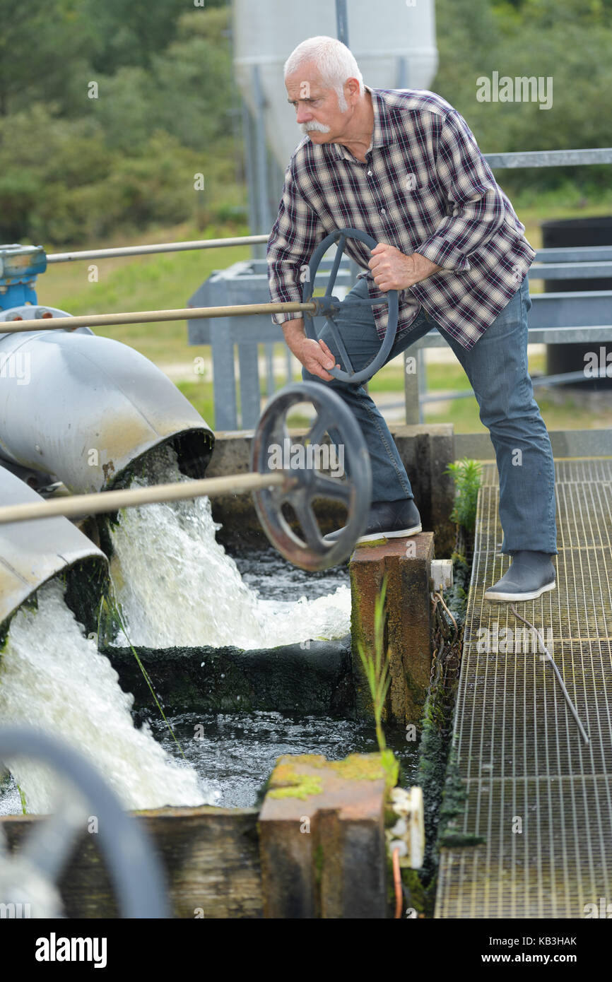 an engineer controlling a quality of water Stock Photo - Alamy