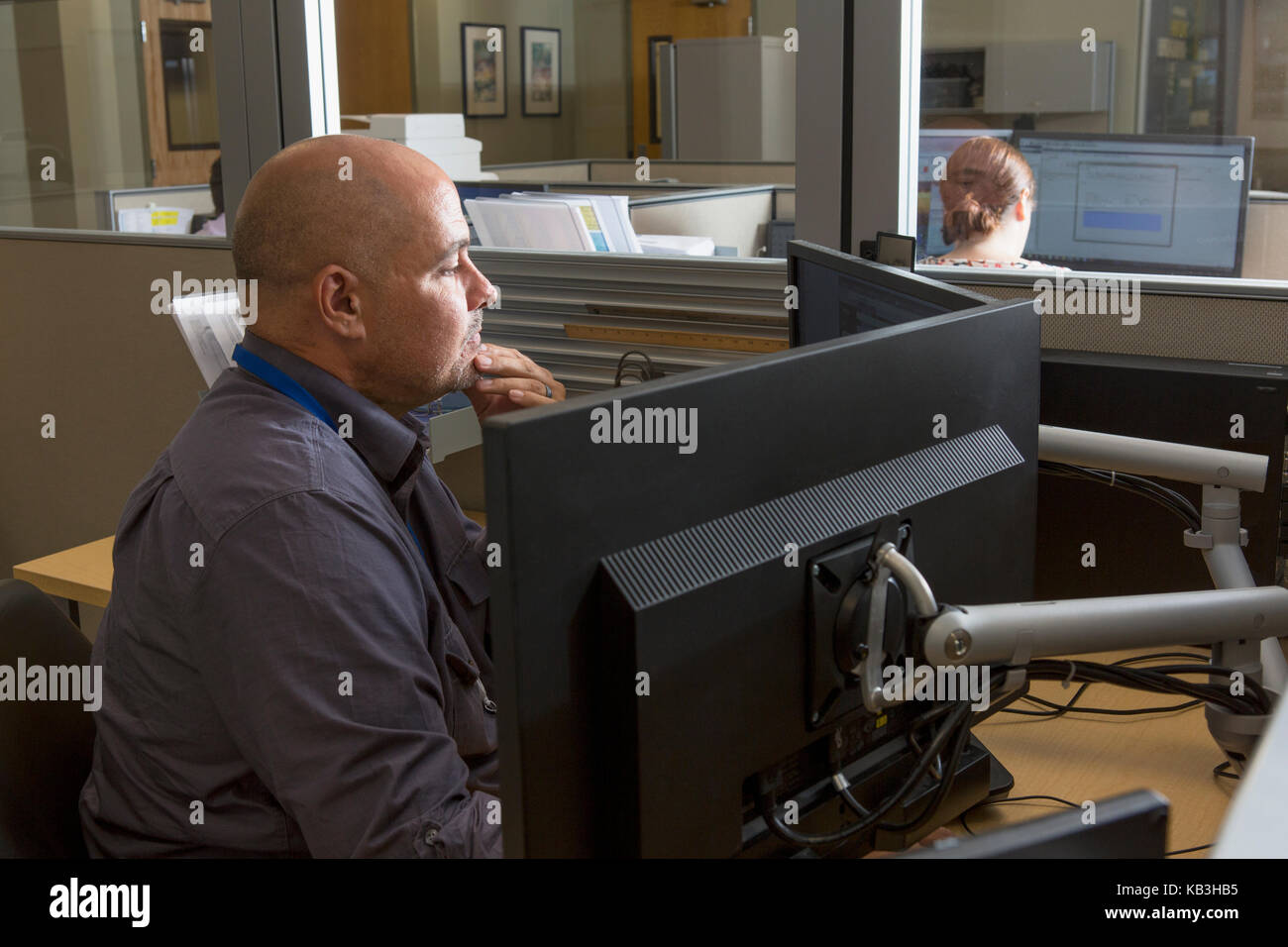 Executives in customer service center of electric power plant Stock ...