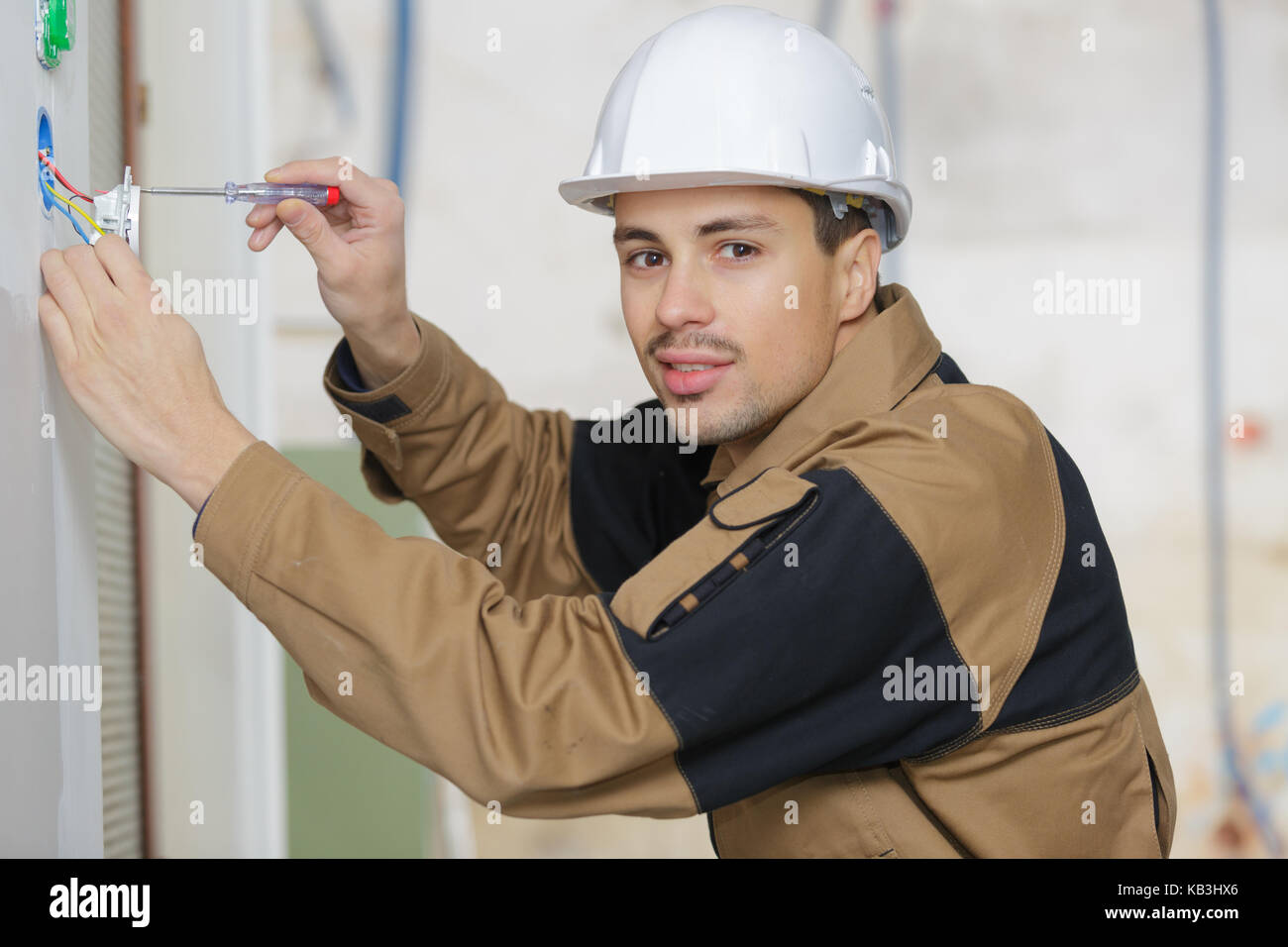 electrician at work Stock Photo - Alamy