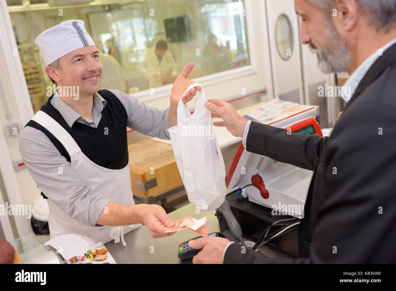 customer buying meat Stock Photo - Alamy