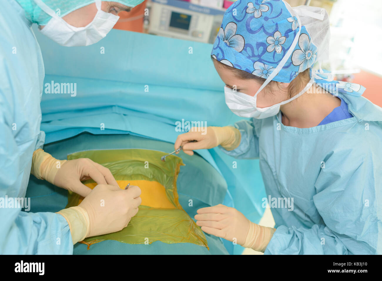 surgeons in operating room Stock Photo - Alamy