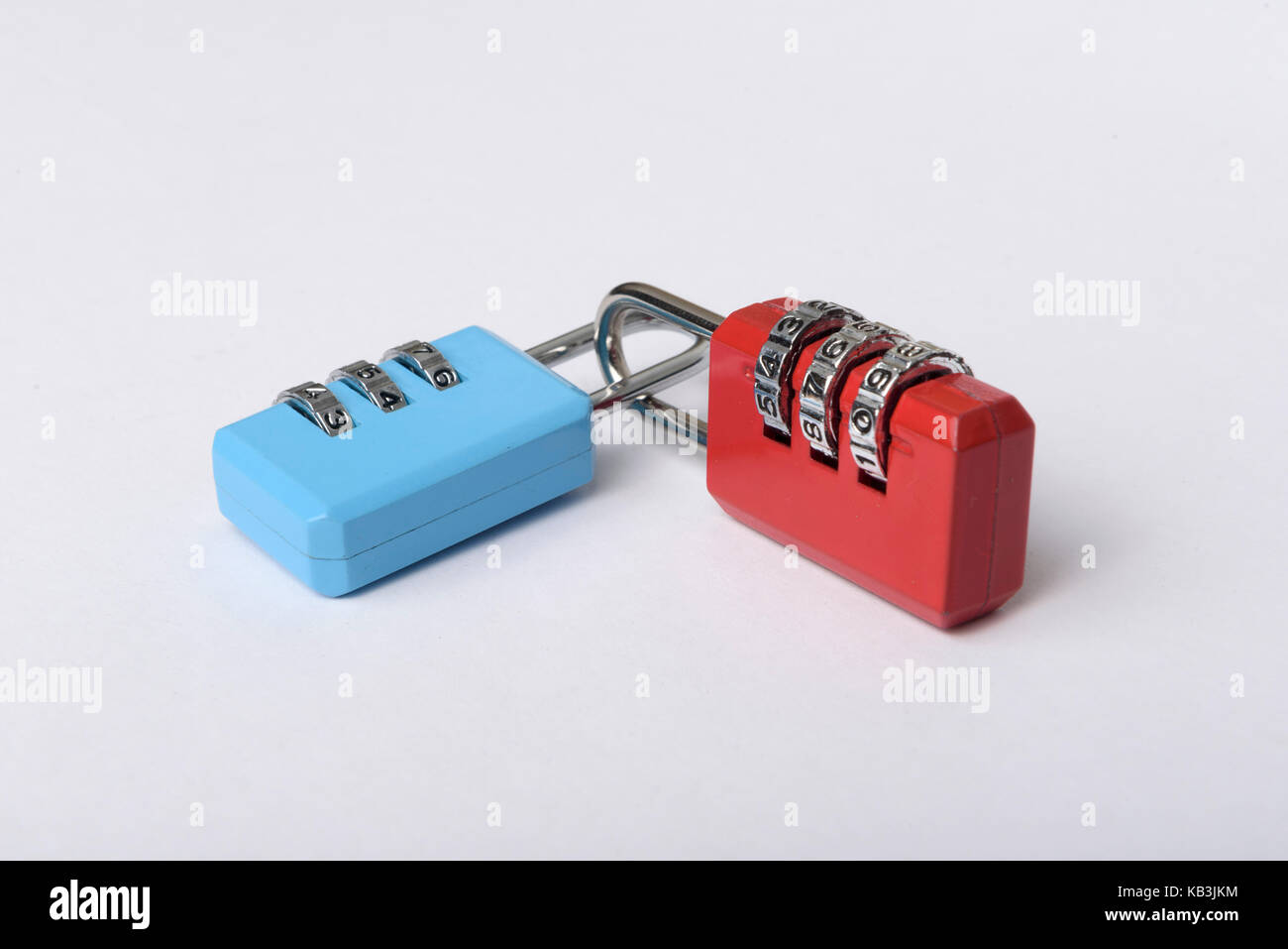 Interlocked blue and red combination padlocks Stock Photo - Alamy