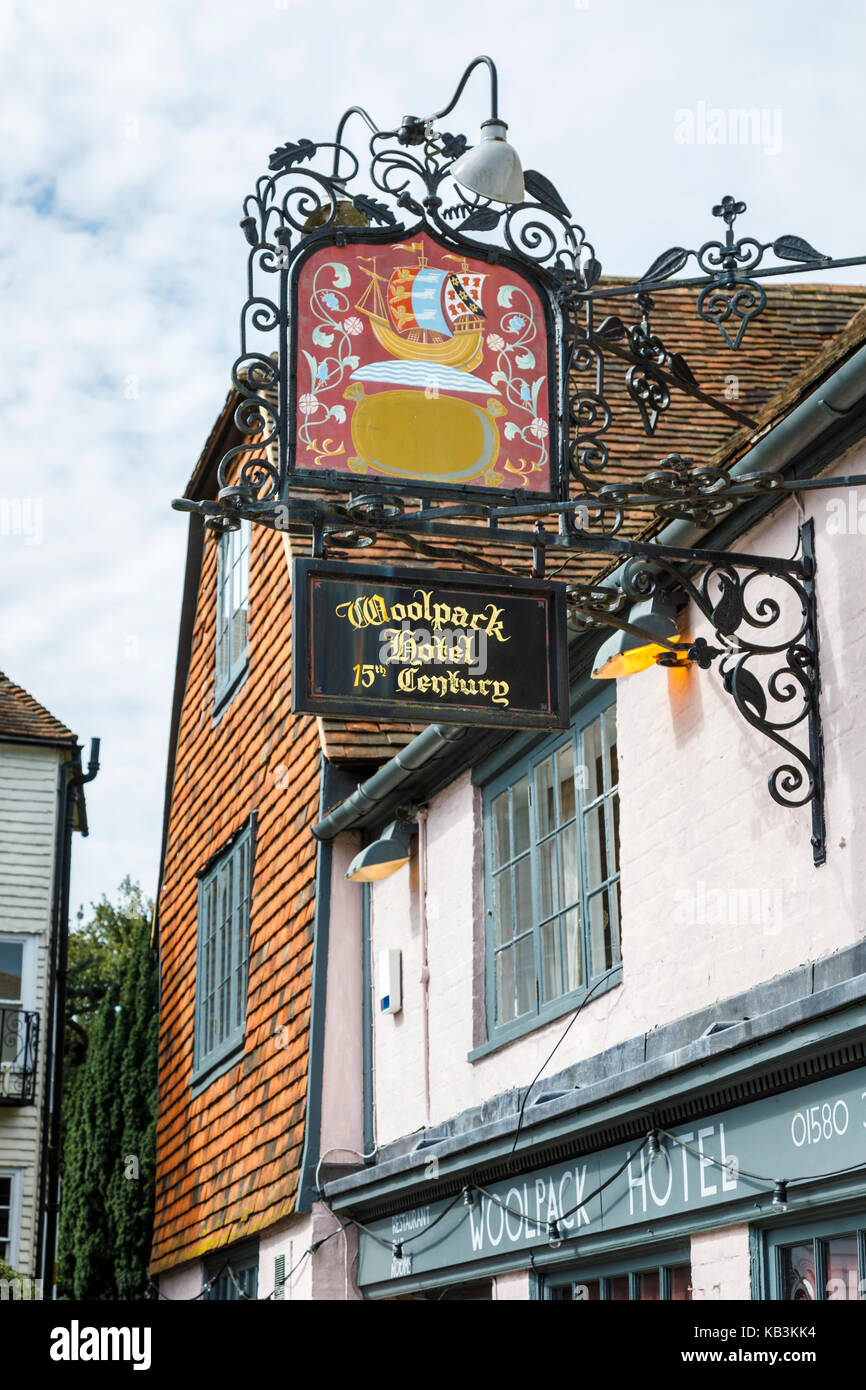Sign for the historic fifteenth century Woolpack Hotel, High Street ...