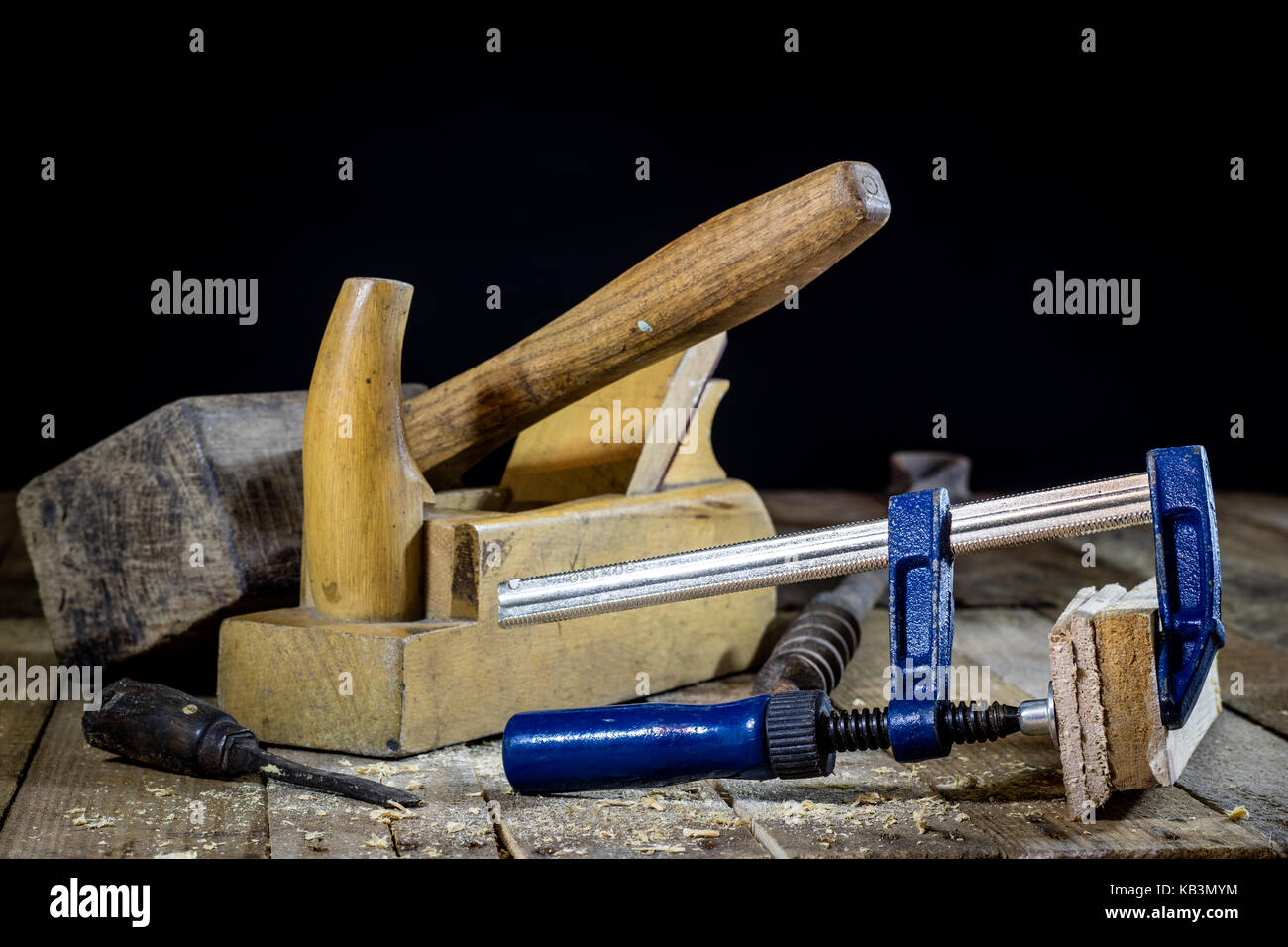 Old good carpentry, tools drill bit. Wooden carpentry table and old ...