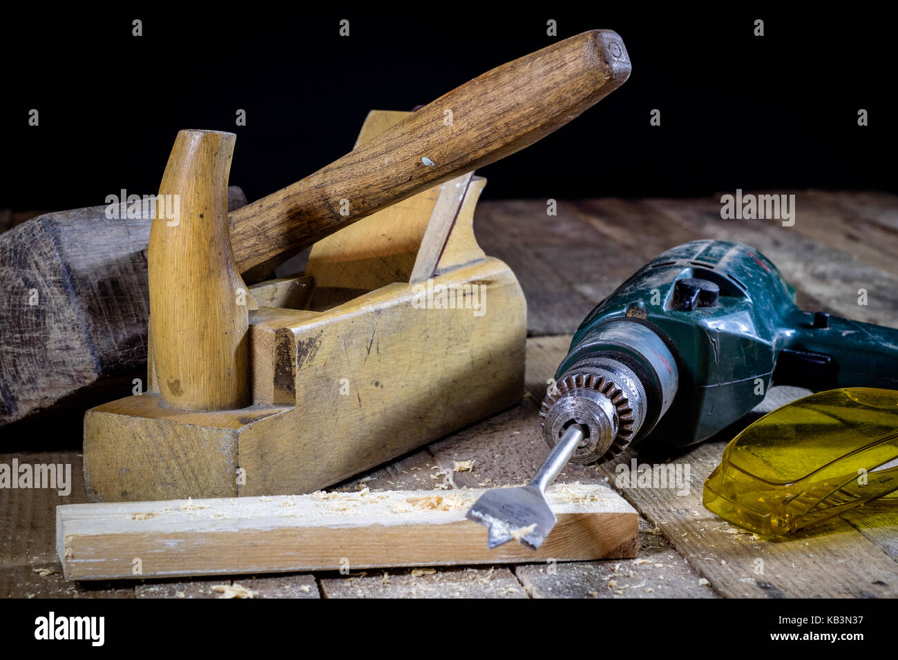 Old good carpentry, tools drill bit. Wooden carpentry table and old ...