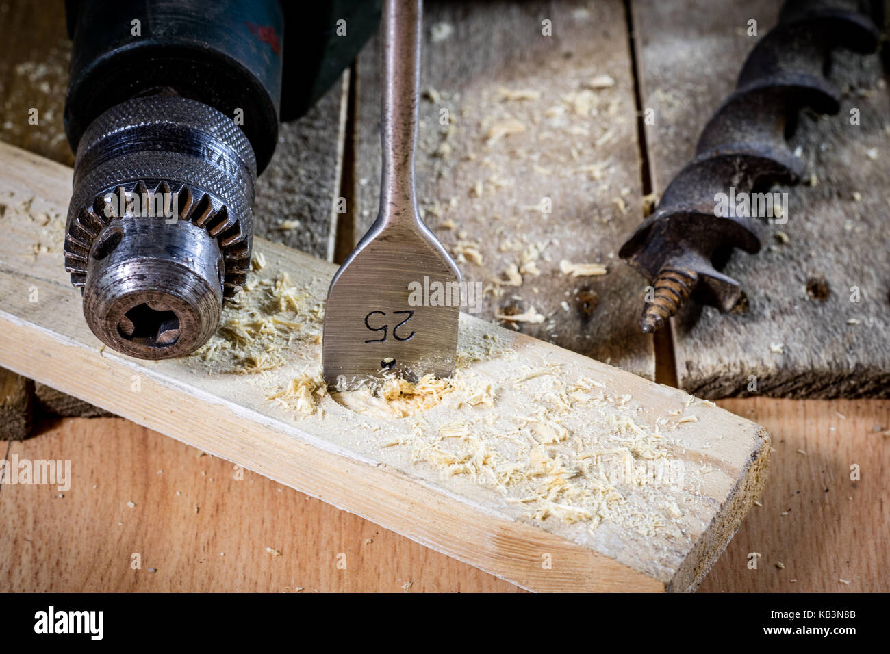 Old good carpentry, tools drill bit. Wooden carpentry table and old ...