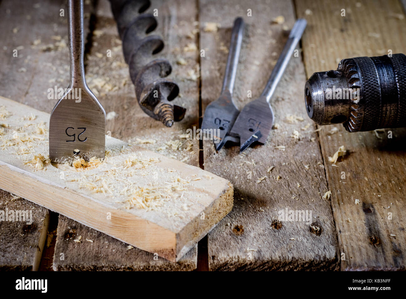 Old good carpentry, tools drill bit. Wooden carpentry table and old ...