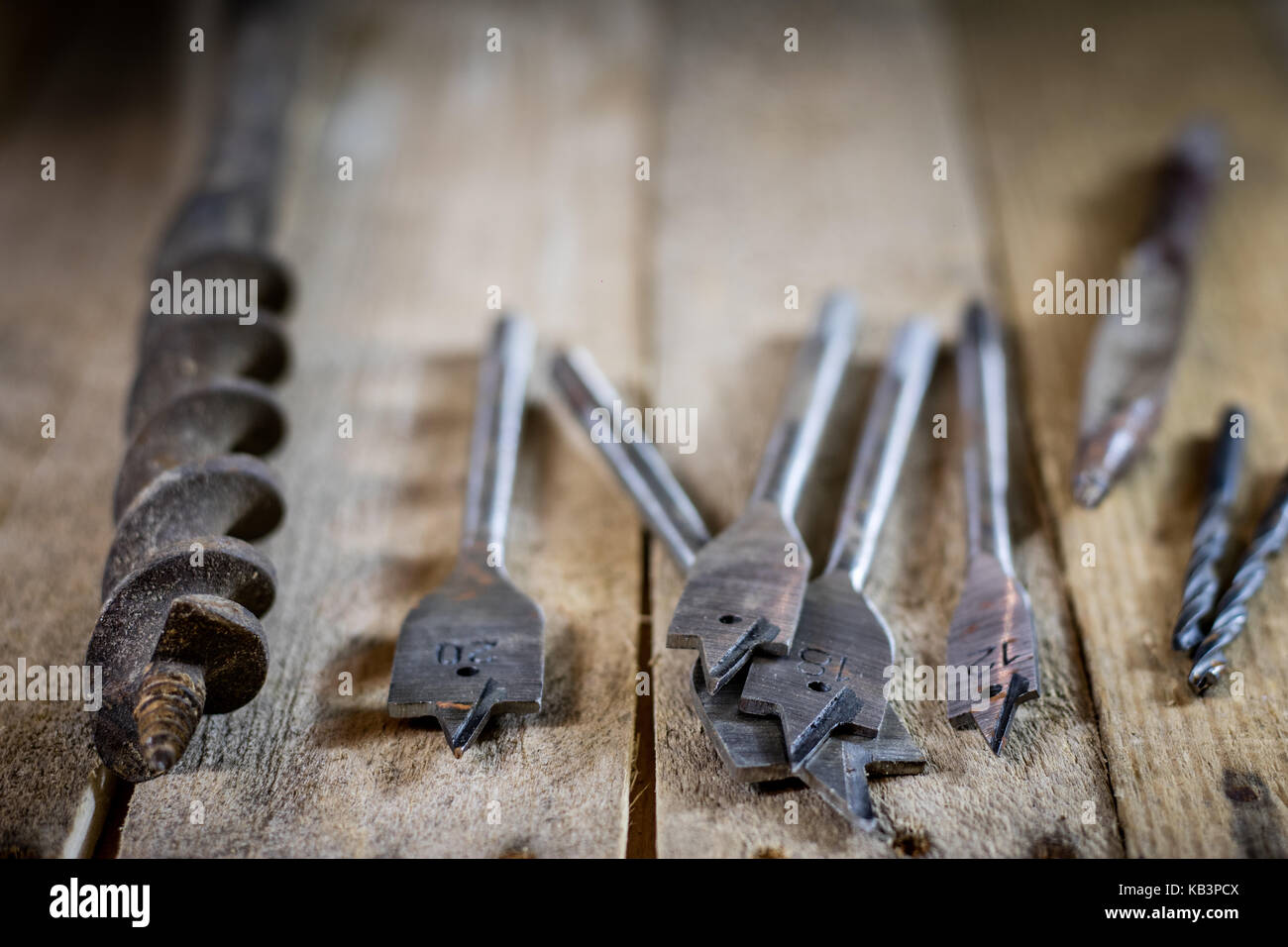 Old good carpentry, tools drill bit. Wooden carpentry table and old ...