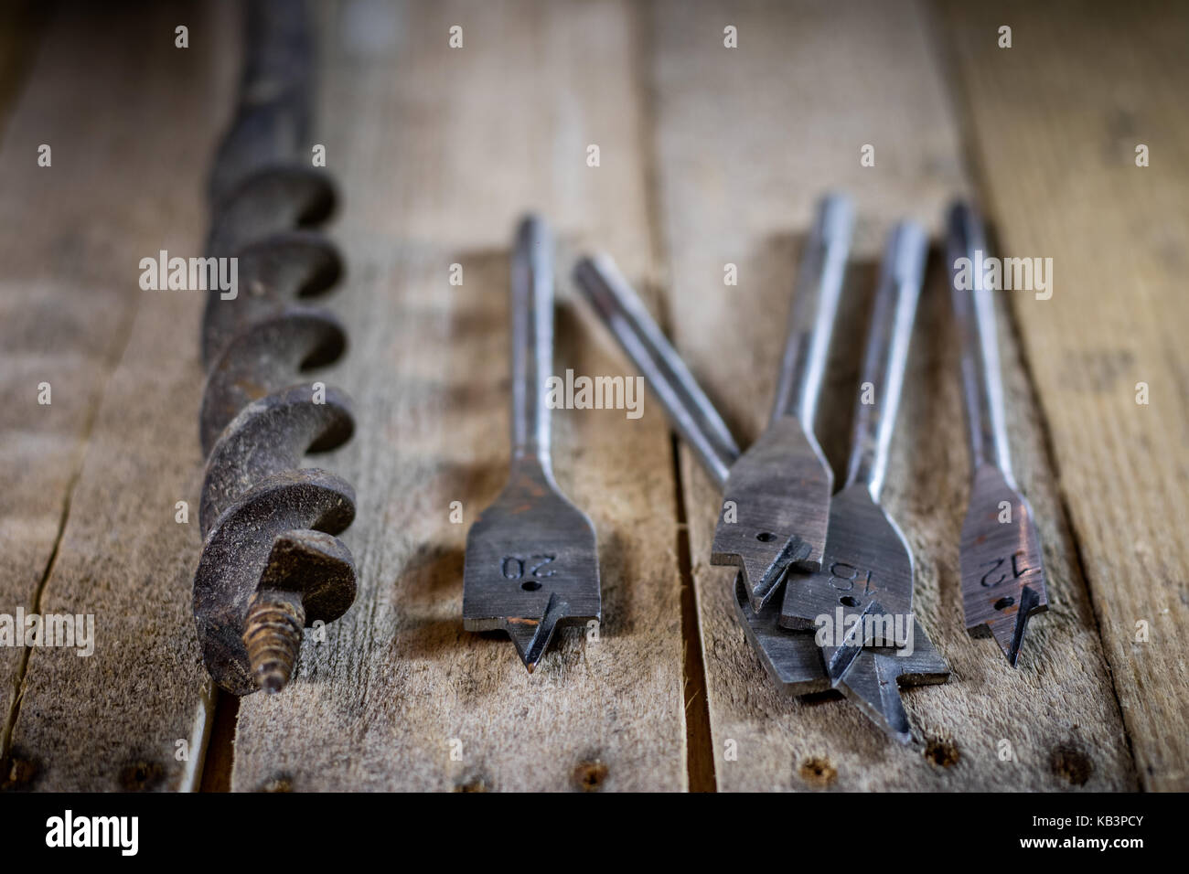 Old good carpentry, tools drill bit. Wooden carpentry table and old ...