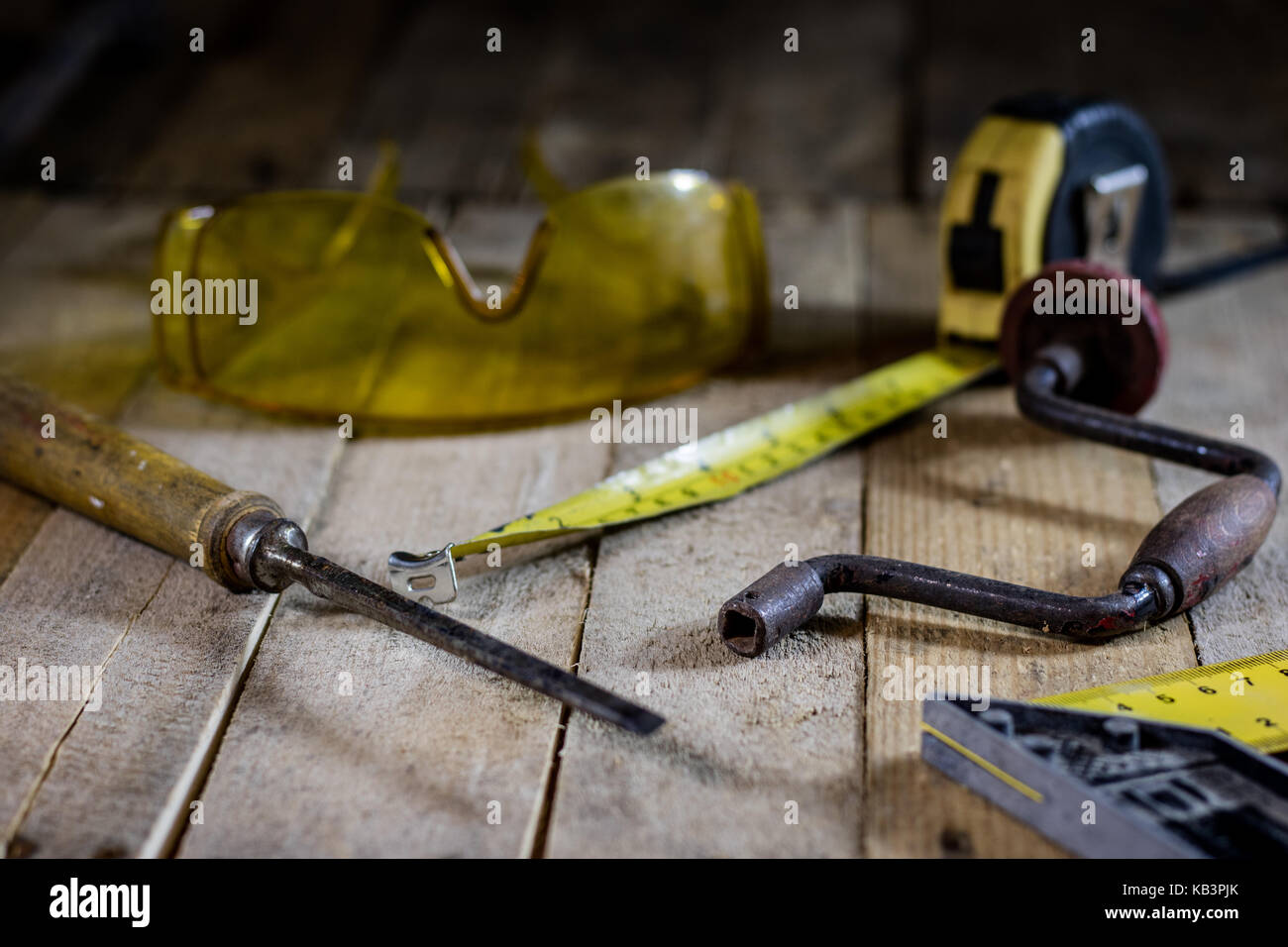 Old good carpentry, tools drill bit. Wooden carpentry table and old ...