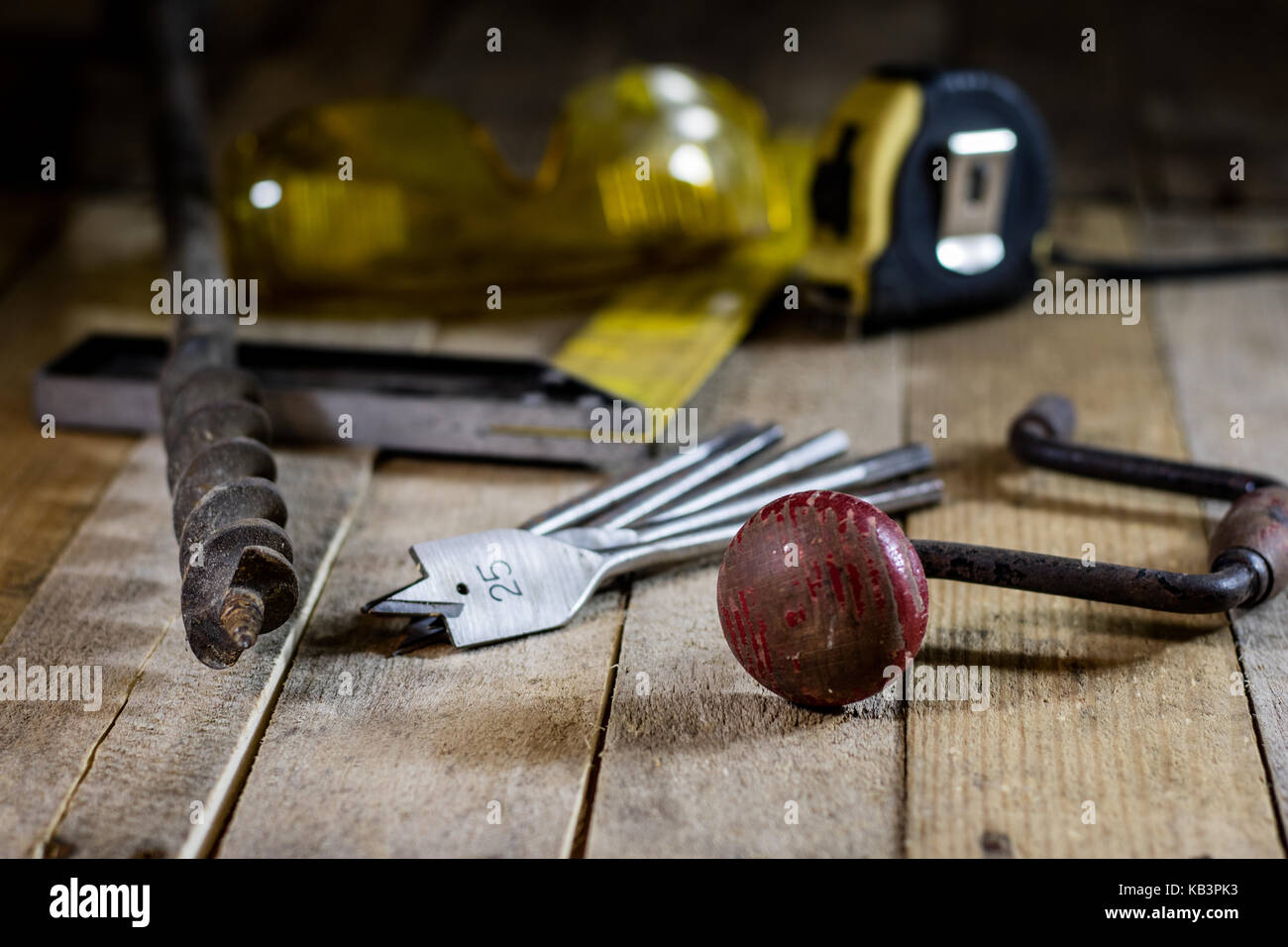 Old good carpentry, tools drill bit. Wooden carpentry table and old ...