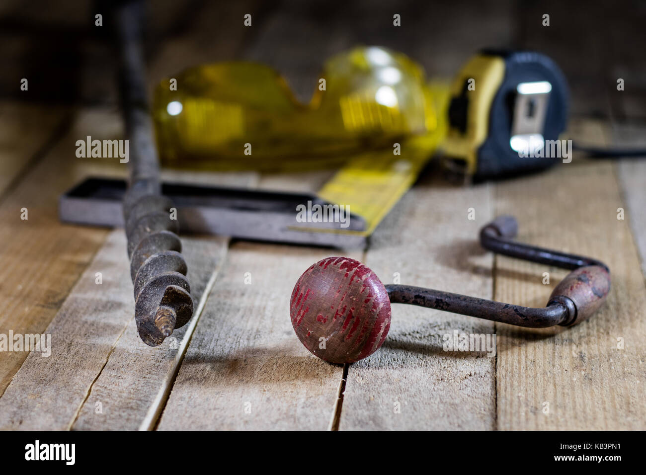 Old good carpentry, tools drill bit. Wooden carpentry table and old ...