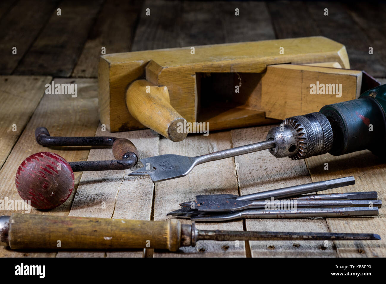 Old good carpentry, tools drill bit. Wooden carpentry table and old ...