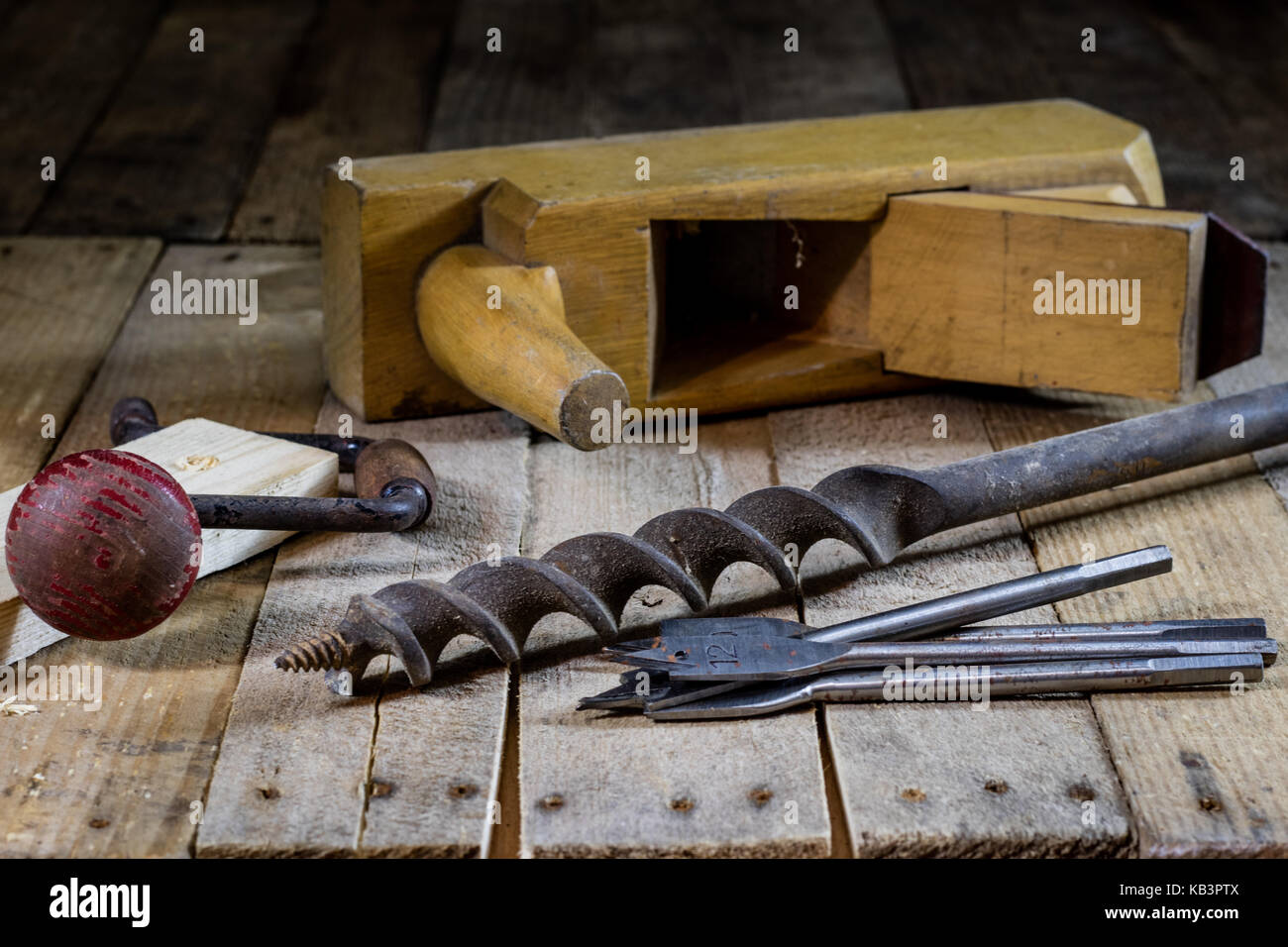 Old good carpentry, tools drill bit. Wooden carpentry table and old ...