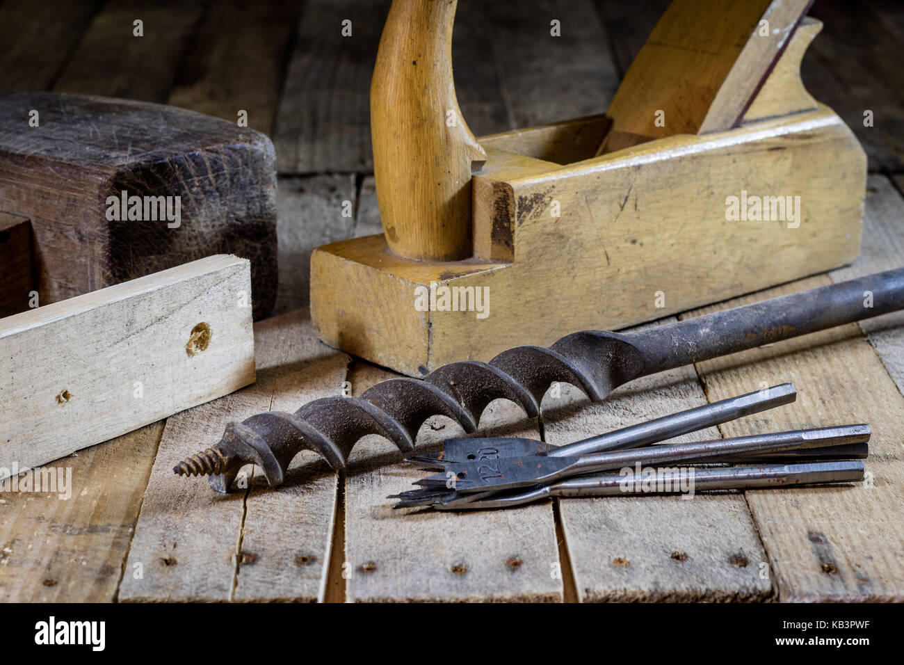 Old good carpentry, tools drill bit. Wooden carpentry table and old ...