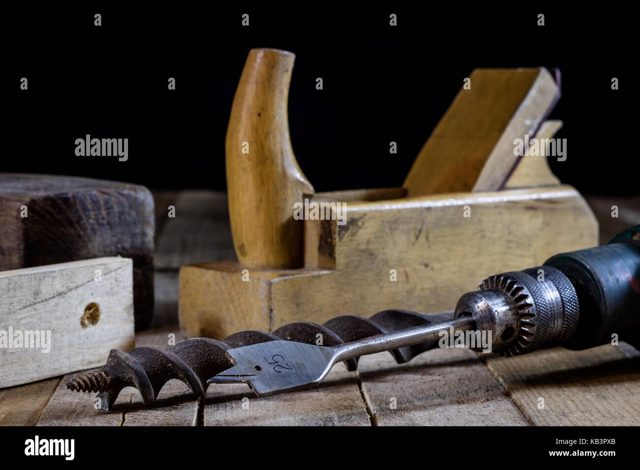Old good carpentry, tools drill bit. Wooden carpentry table and old ...