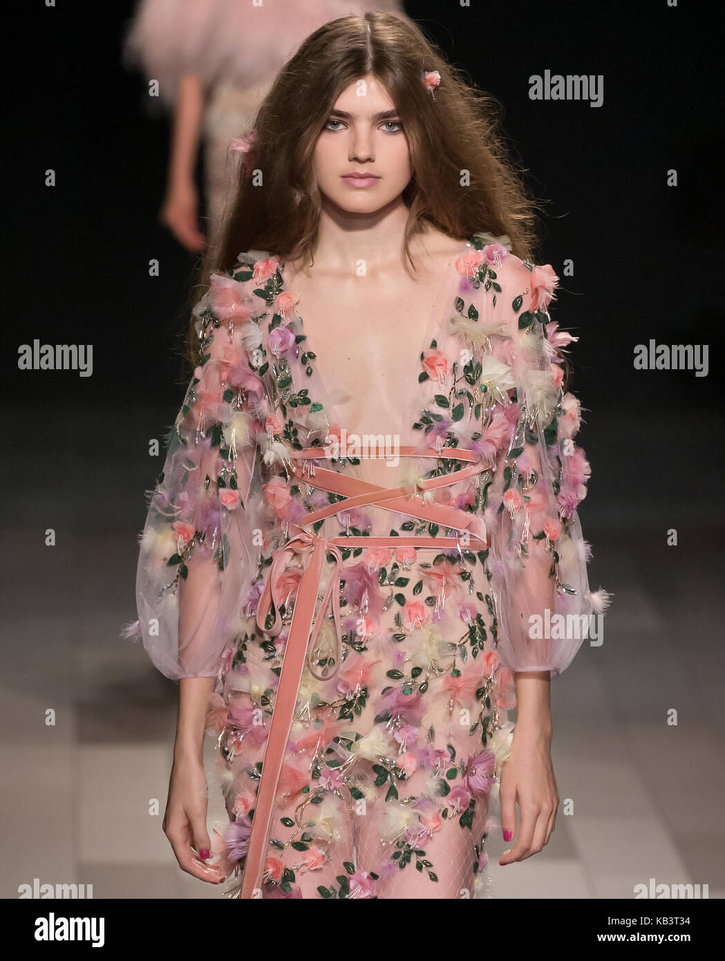 NEW YORK, NY - September 13, 2017: Skylar Tartz walks the runway at the ...