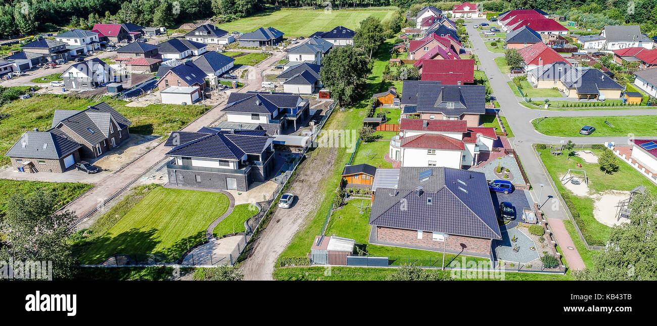 Aerial photo with the drone, anew build-up plot with single houses and ...