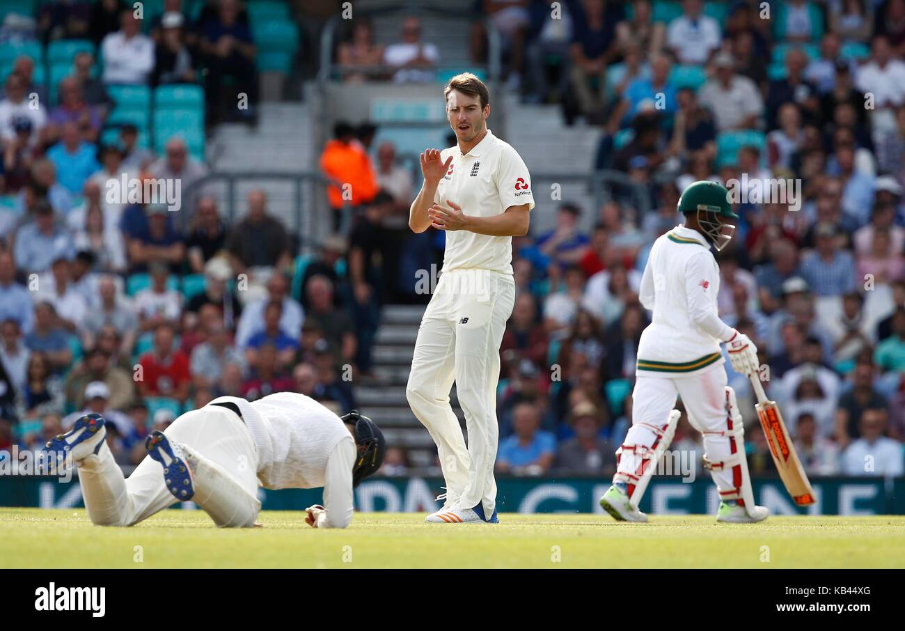 Toby Roland-Jones of England applauds Dawid Malan's fielding at short ...