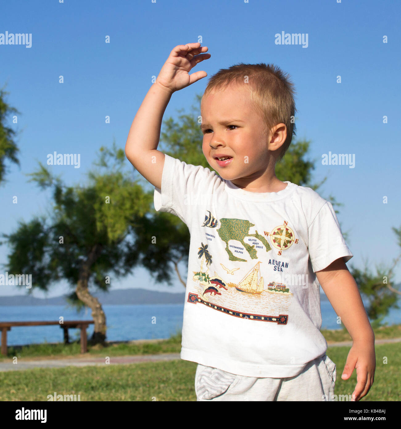 Cute little boy in park Stock Photo - Alamy