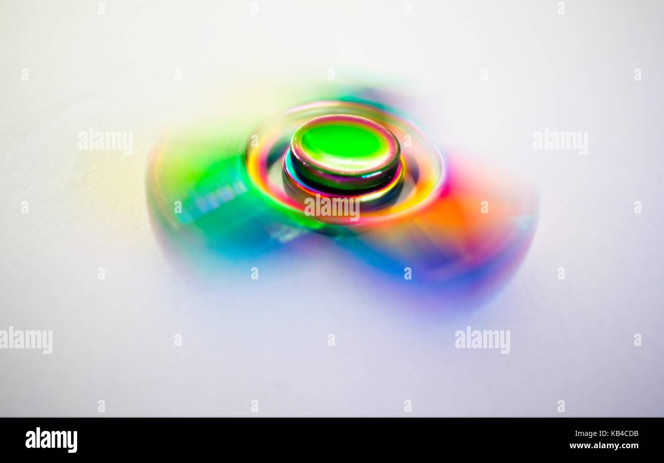 Colourful fidget spinner Stock Photo - Alamy