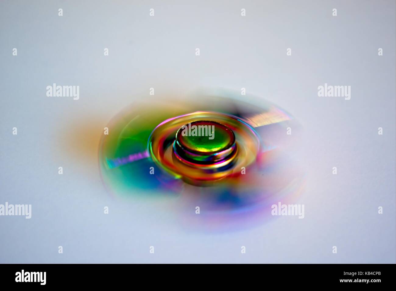 Colourful fidget spinner Stock Photo - Alamy