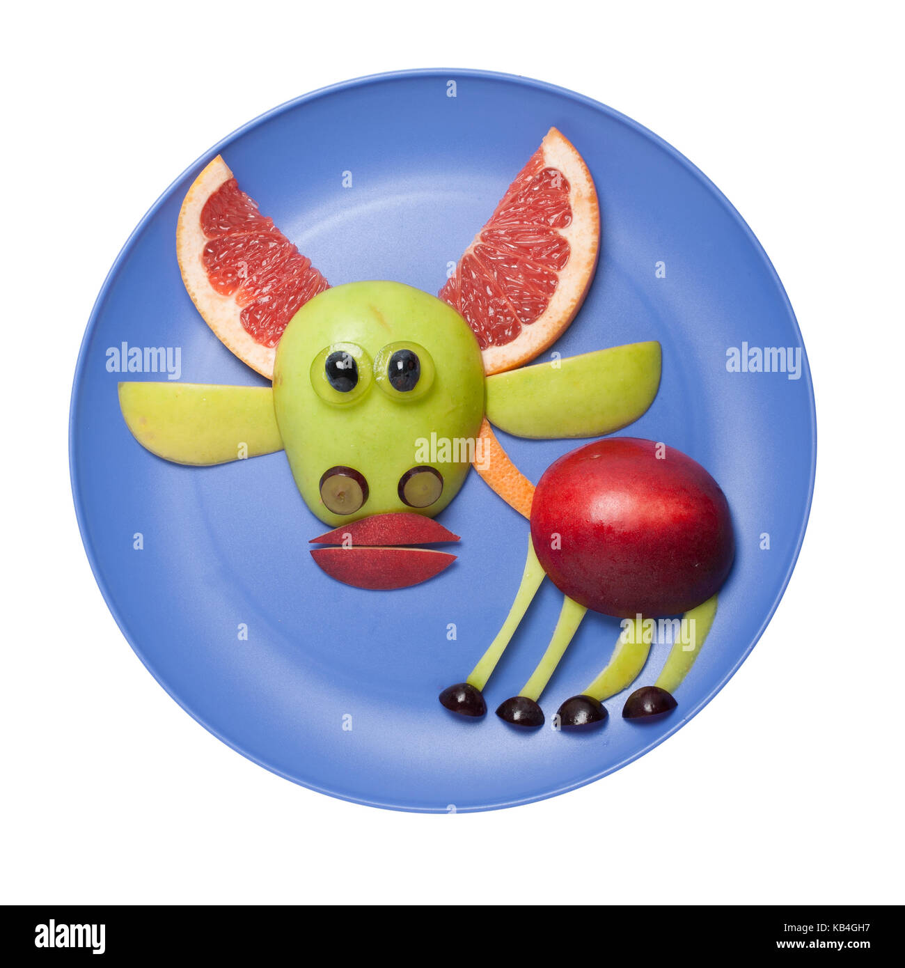 Deer made with fruits on blue plate Stock Photo - Alamy