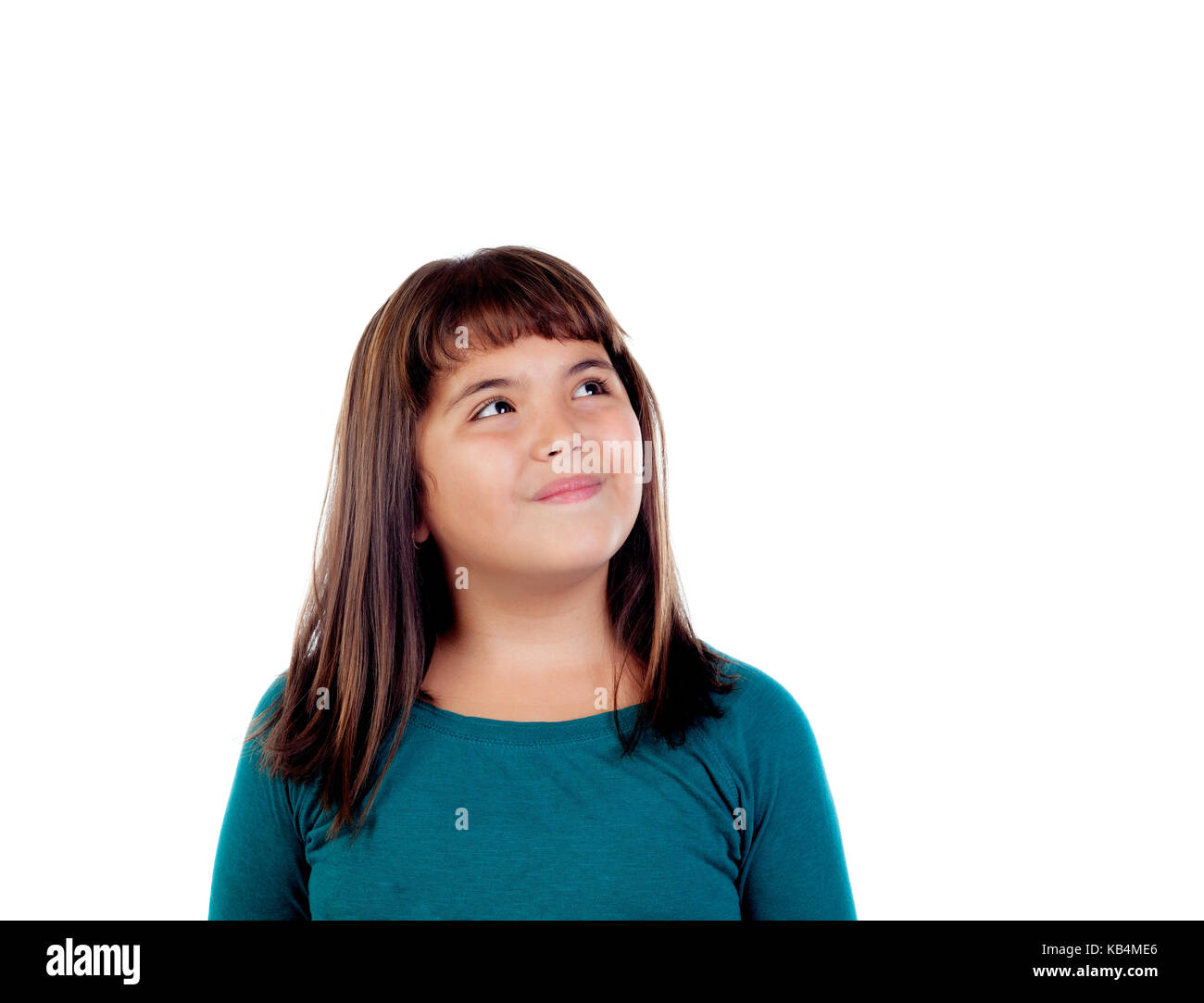 Adorable girl with eleven years old looking up isolated on a white ...