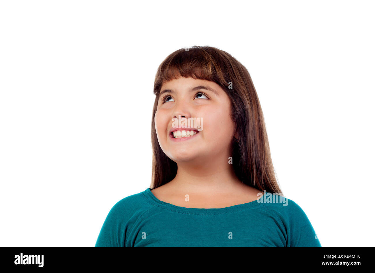 Adorable girl with eleven years old looking up isolated on a white ...