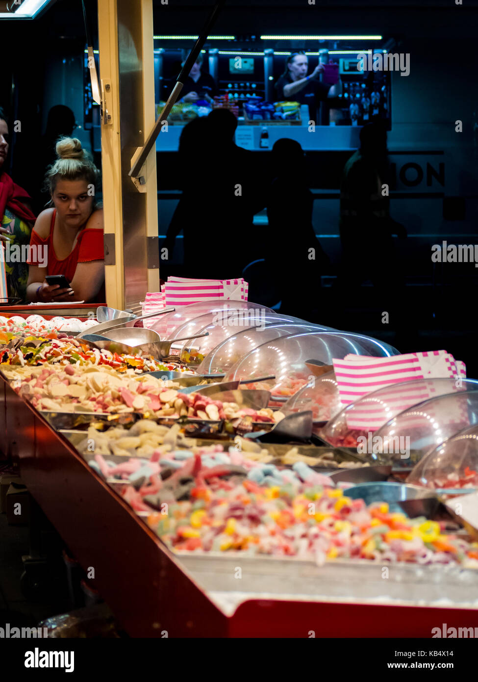 A traditional sweet pick n mix stall at a night time market Stock Photo ...