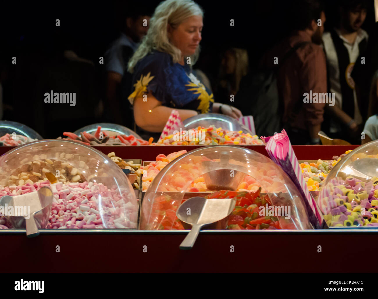 A traditional sweet pick n mix stall at a night time market Stock Photo ...