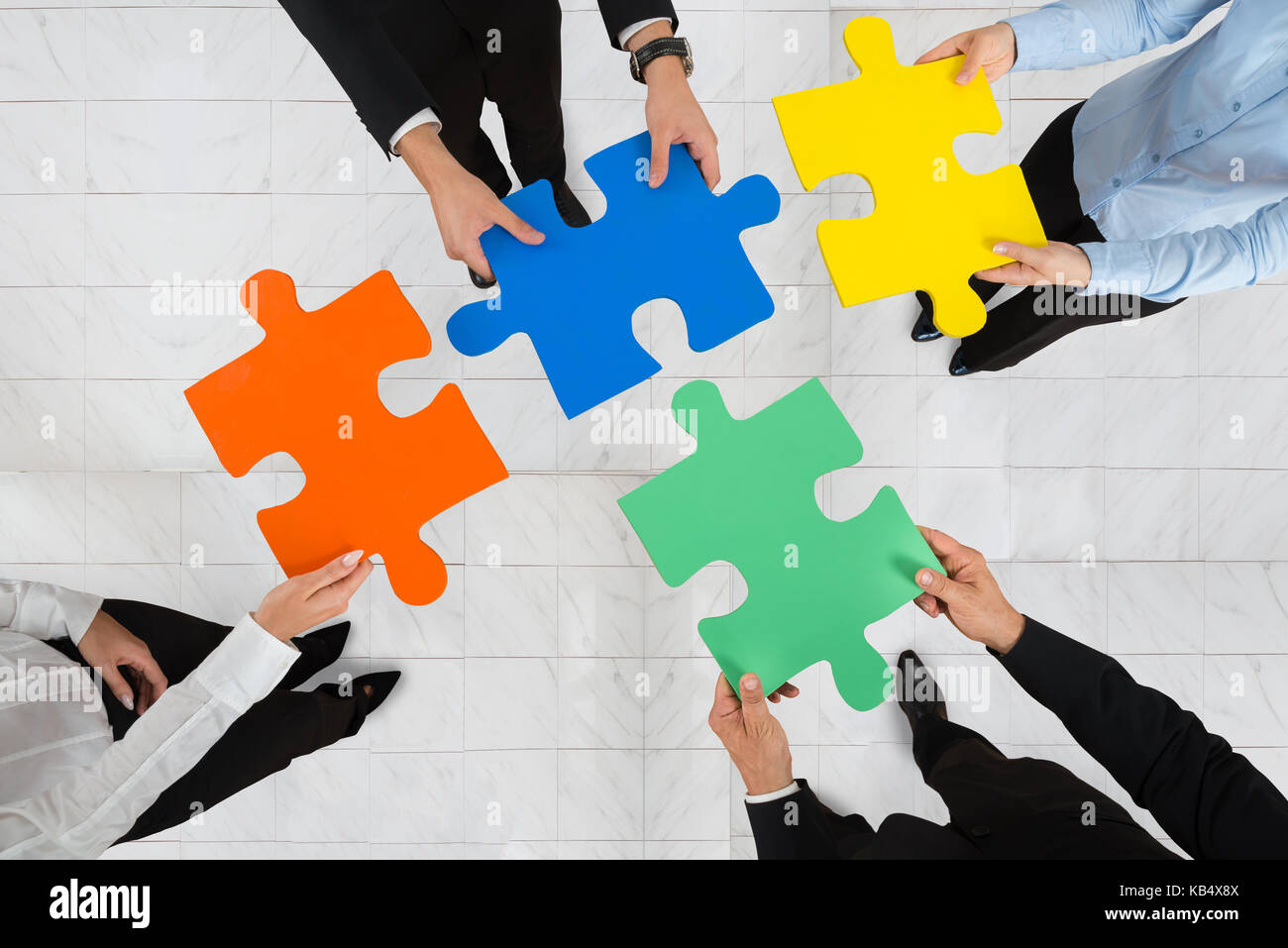 Team puzzle pieces hi-res stock photography and images - Alamy