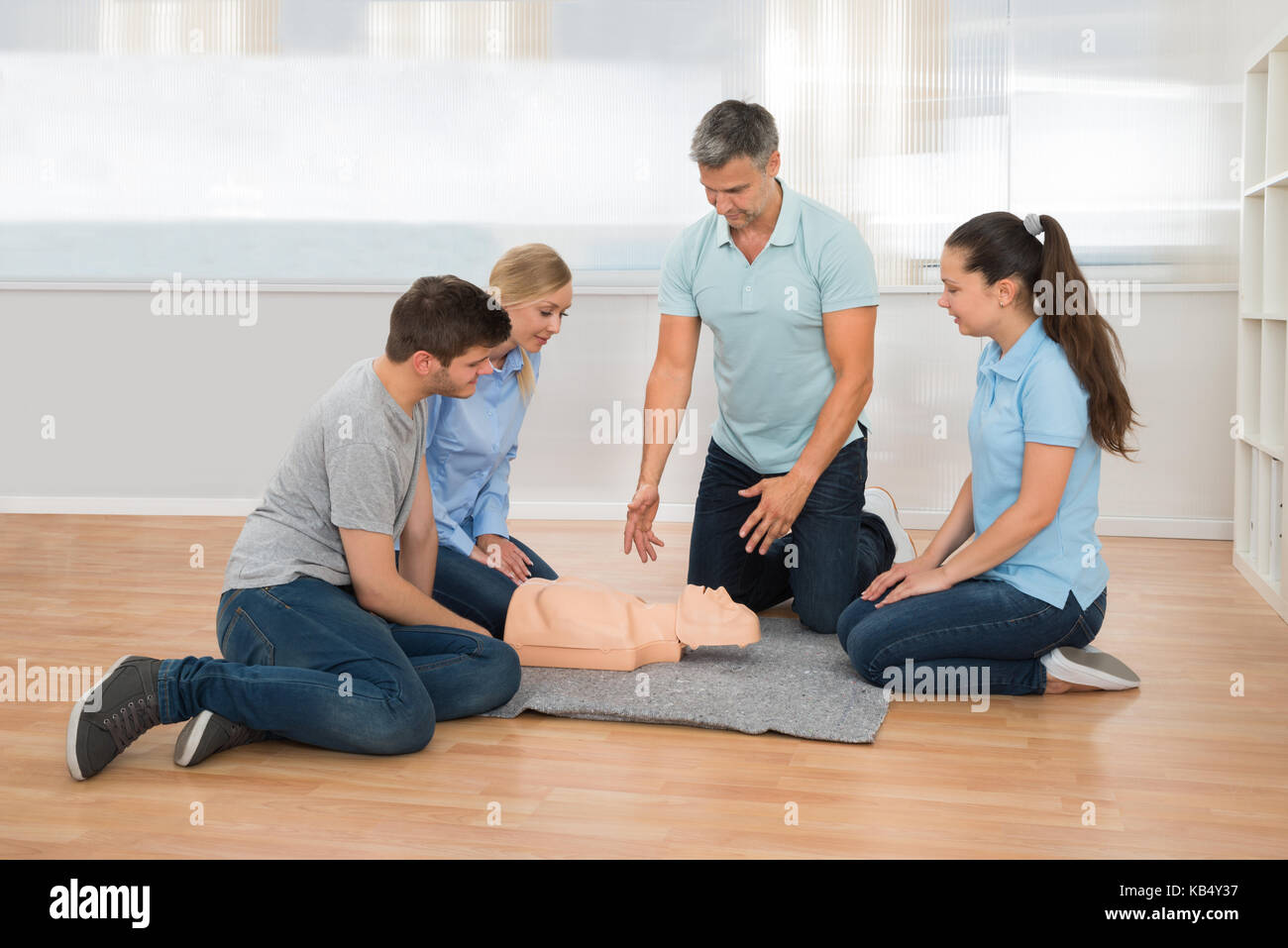 Male Instructor Showing Resuscitation Technique To His Students Stock ...