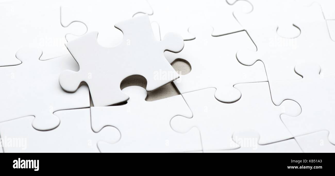 Close up of the pieces of a puzzle Stock Photo - Alamy