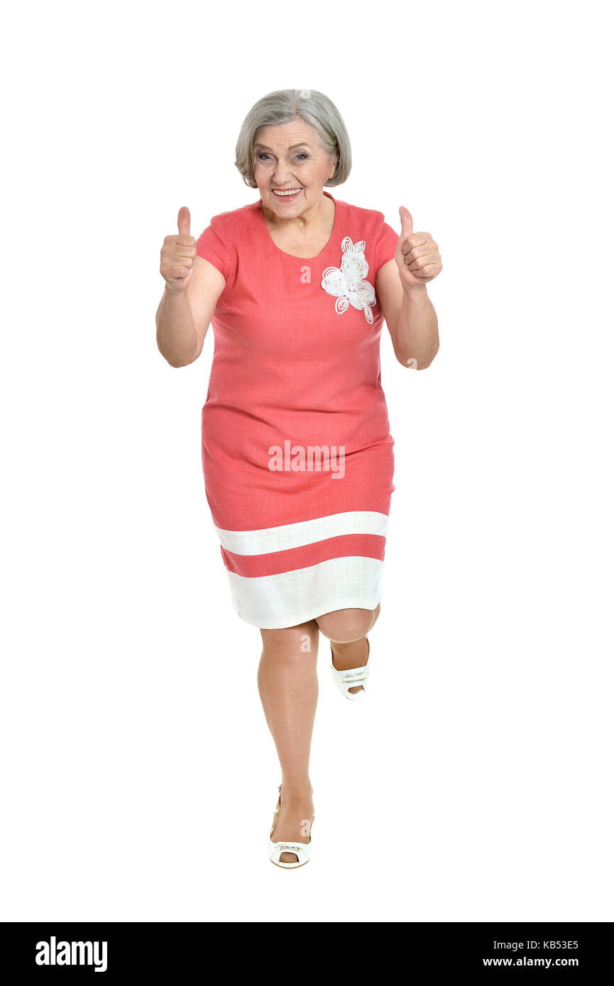 Senior woman in pink dress Stock Photo - Alamy