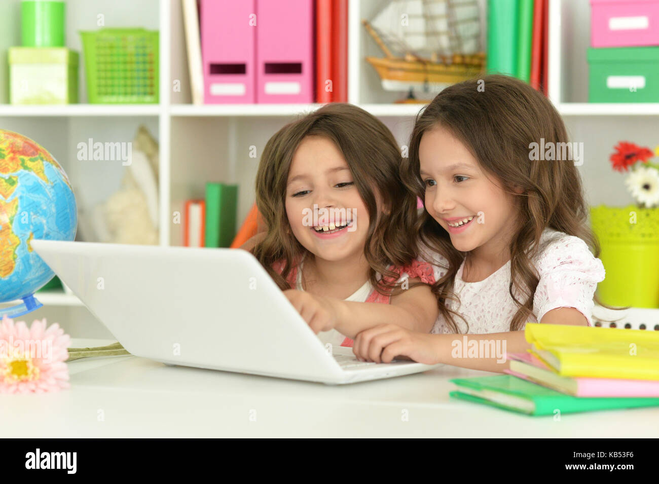 beautiful little girls at classroom Stock Photo - Alamy