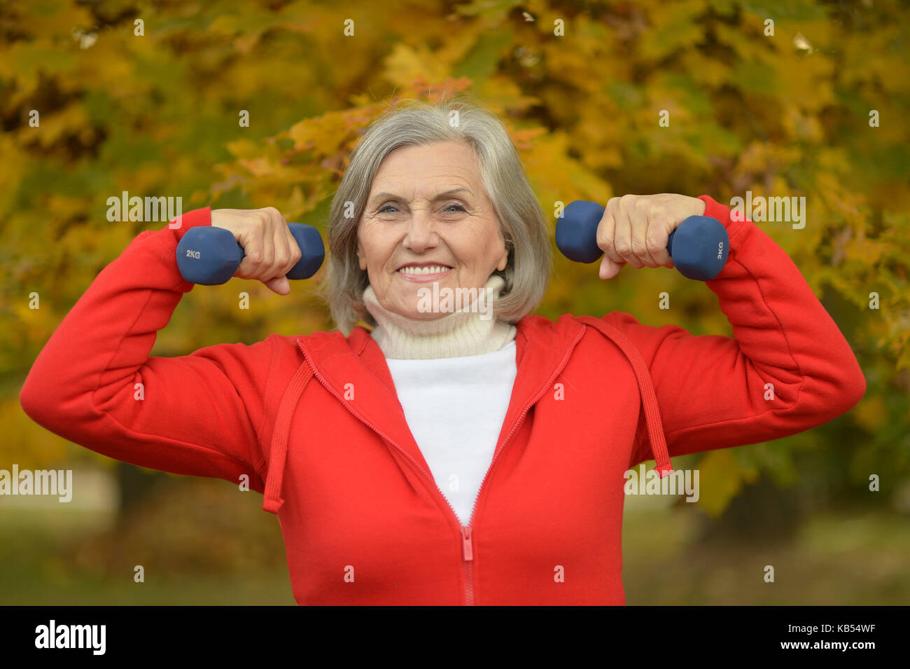 Old woman dumbbells hi-res stock photography and images - Alamy