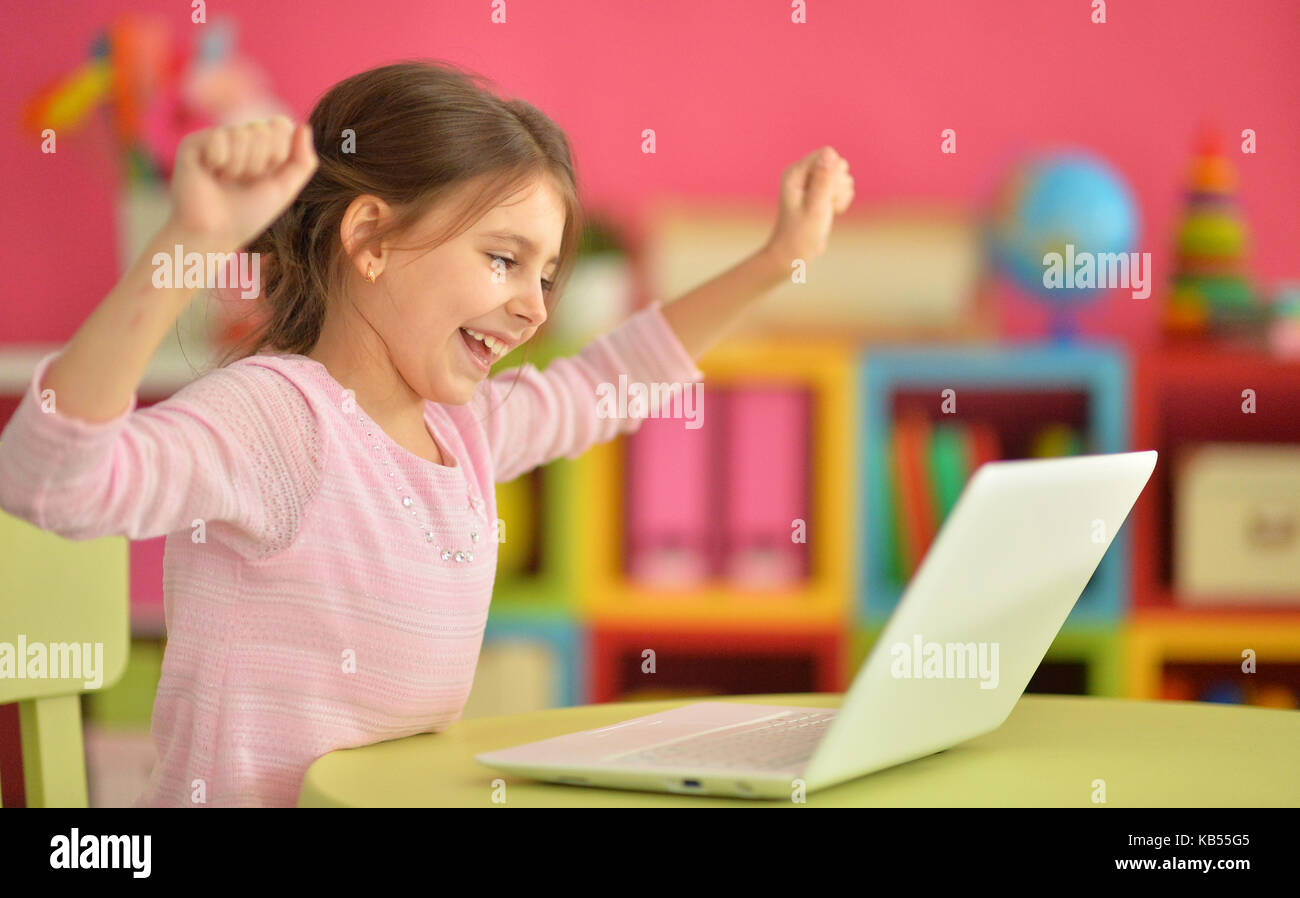 happy girl using laptop Stock Photo - Alamy