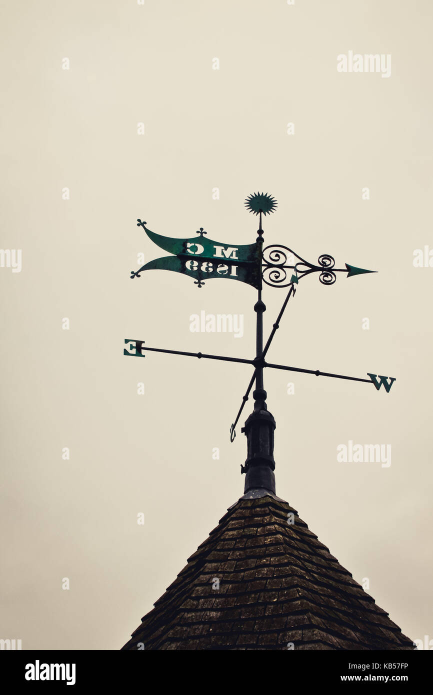 Weathervane on house roof, England, Great Britain Stock Photo - Alamy