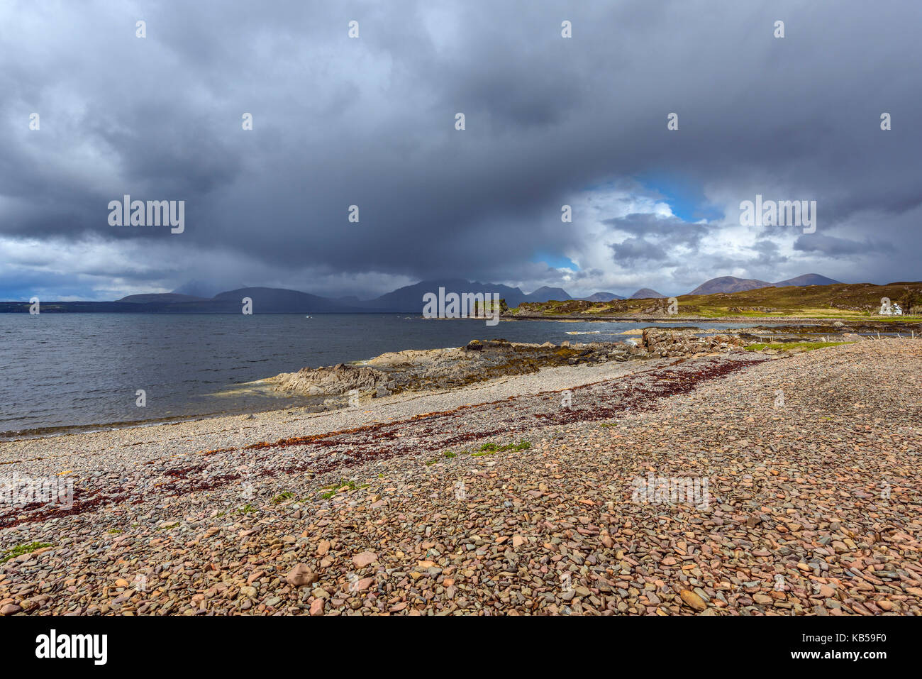 Lonely stone beach, Isle of Skye, Scotland, United Kingdom Stock Photo ...