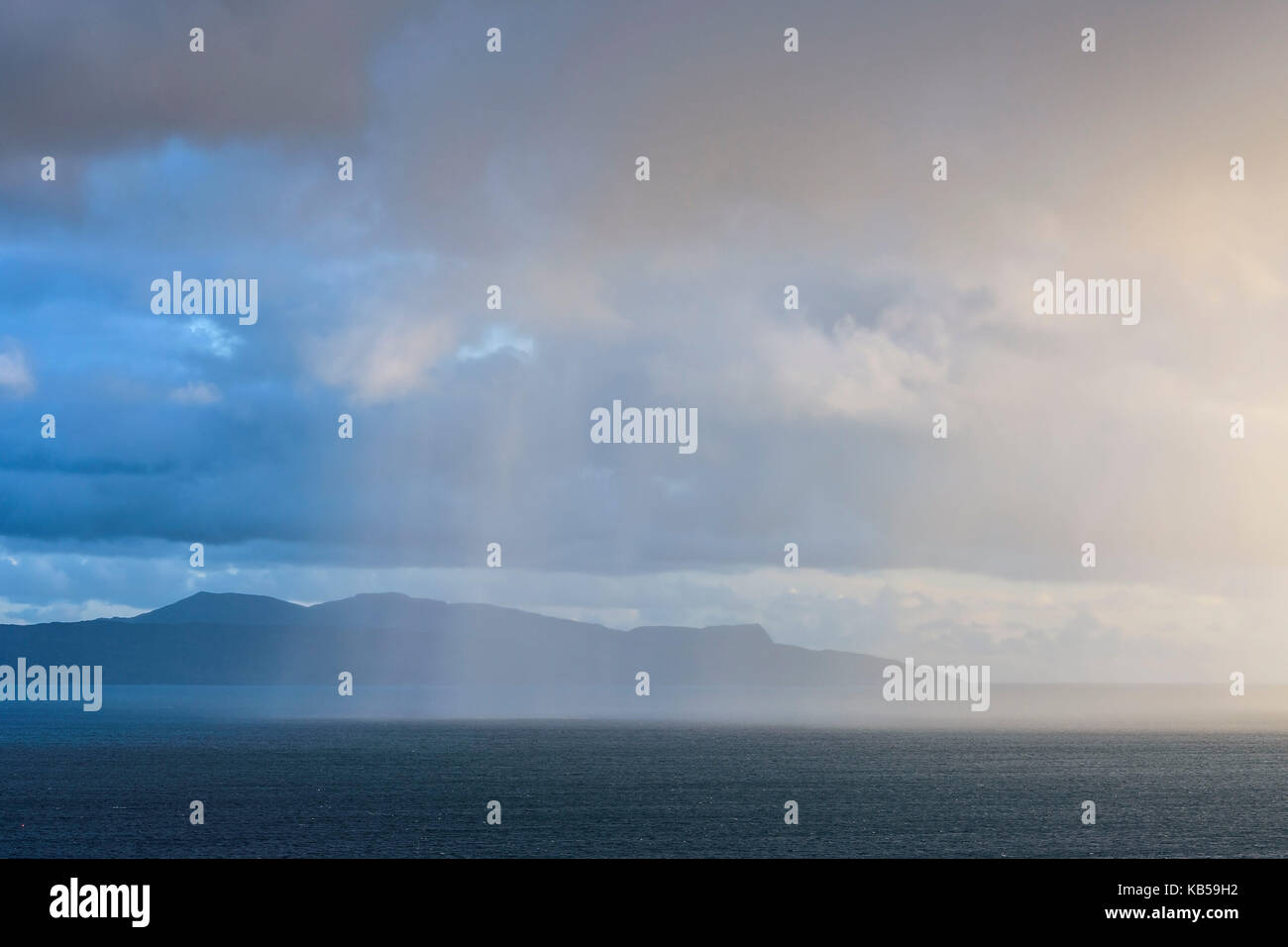 Coast with rain over sea, Isle of Skye, Scotland, United Kingdom Stock ...