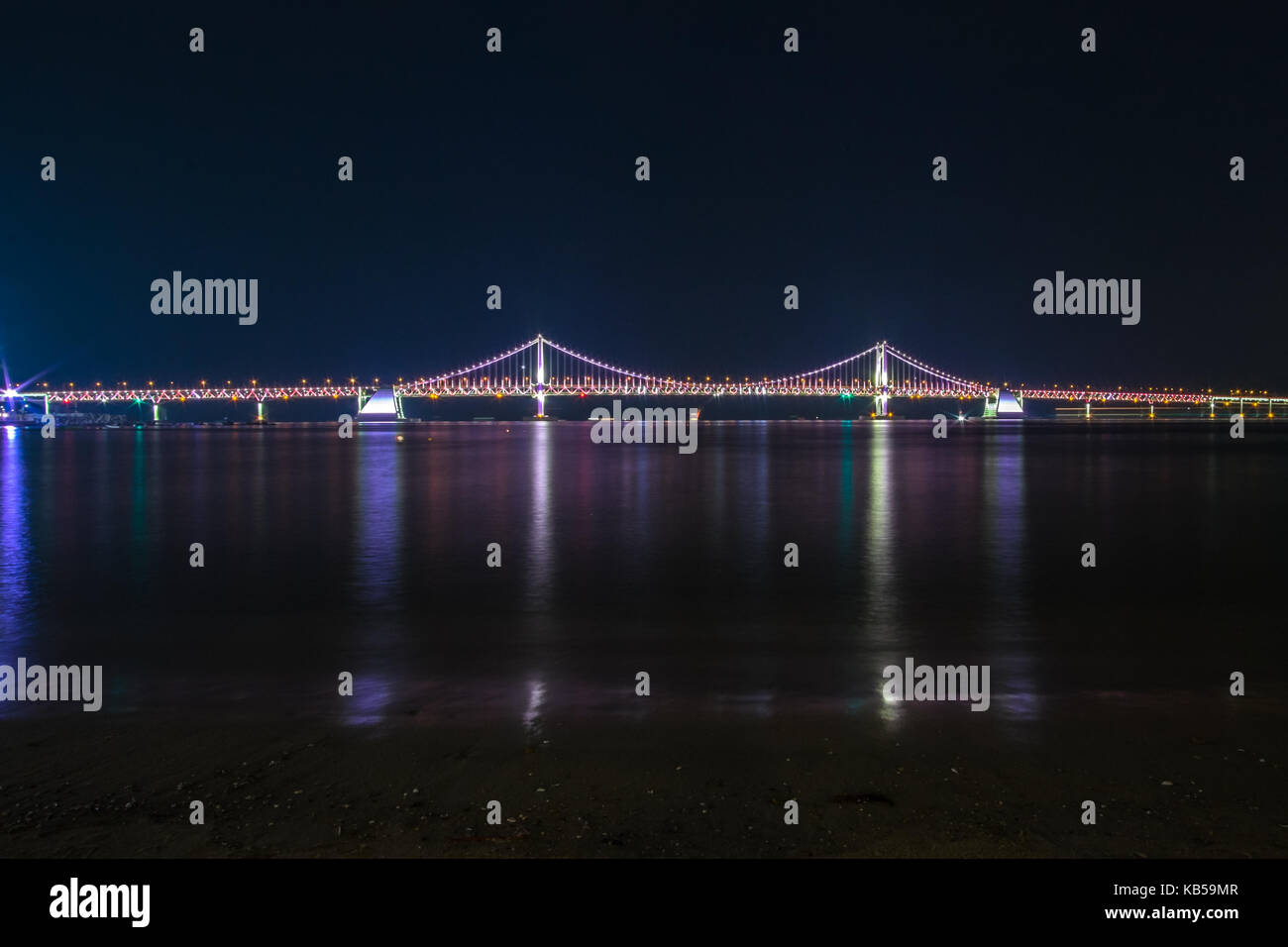 Gwangalli beach and Gwangan bridge at night in Busan of South Korea ...