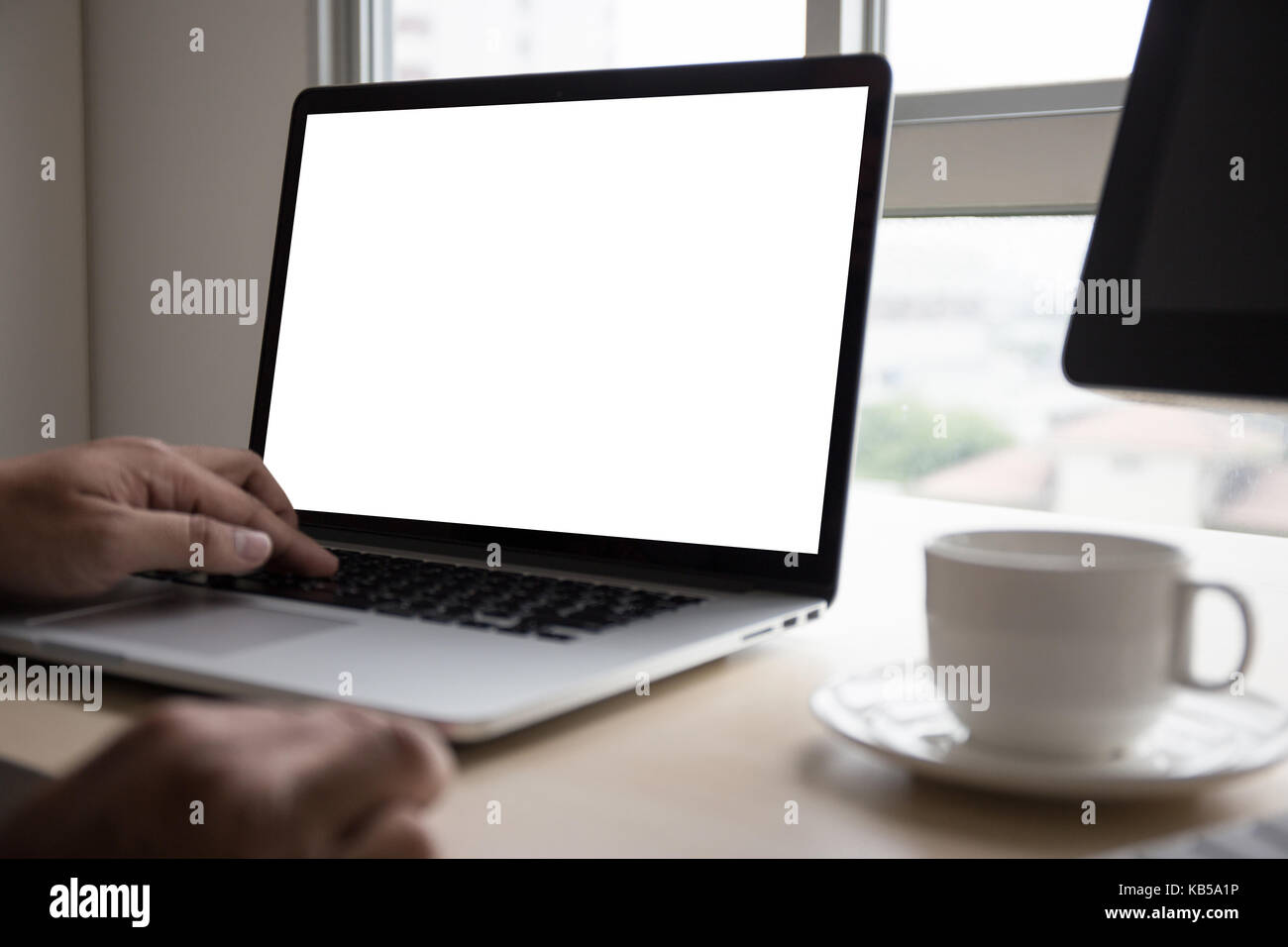 young man working Businessman using a desktop computer of the blank ...