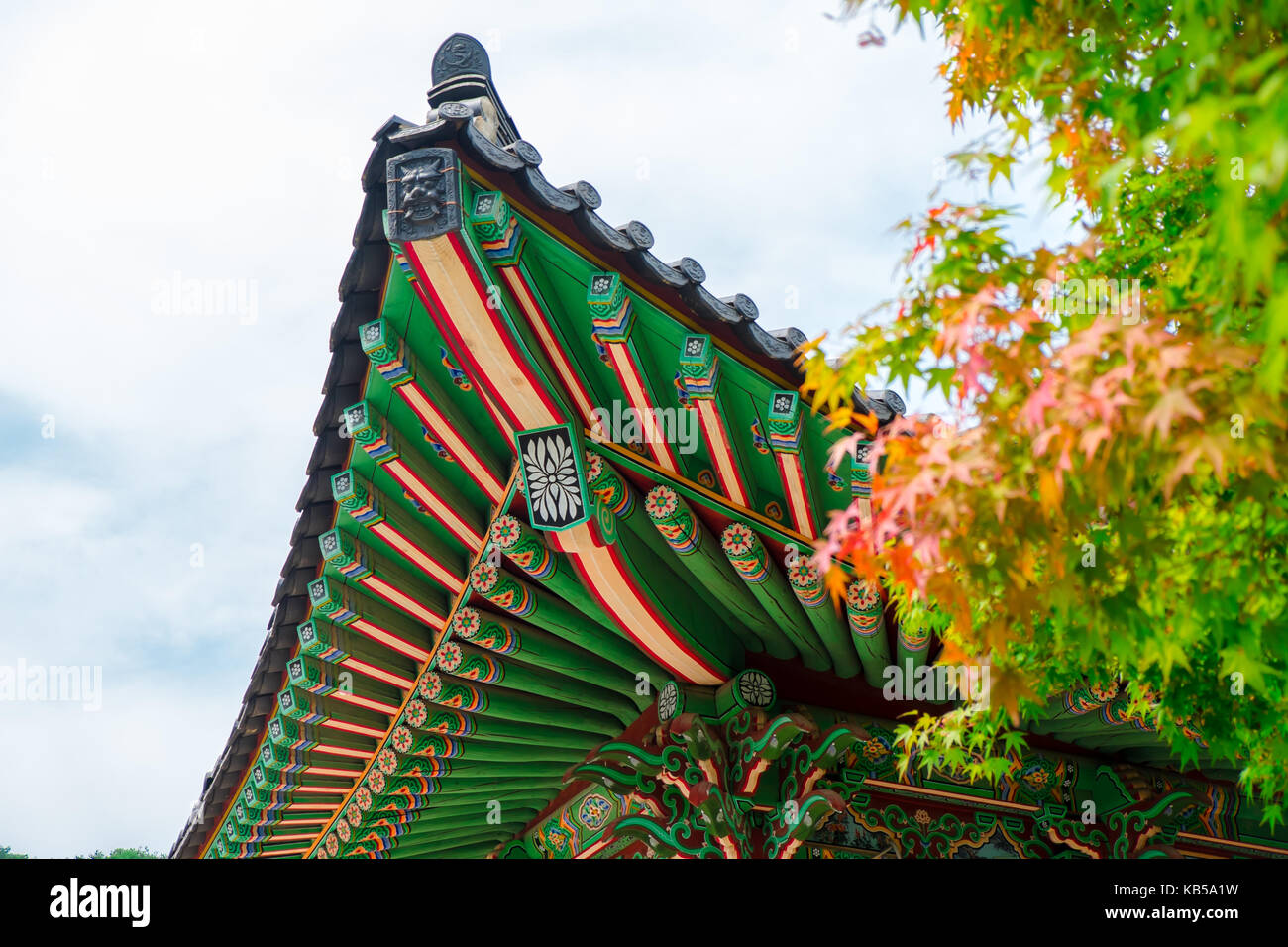 Colorful pattern on the temple roof with maple leafs at Beomeosa temple ...