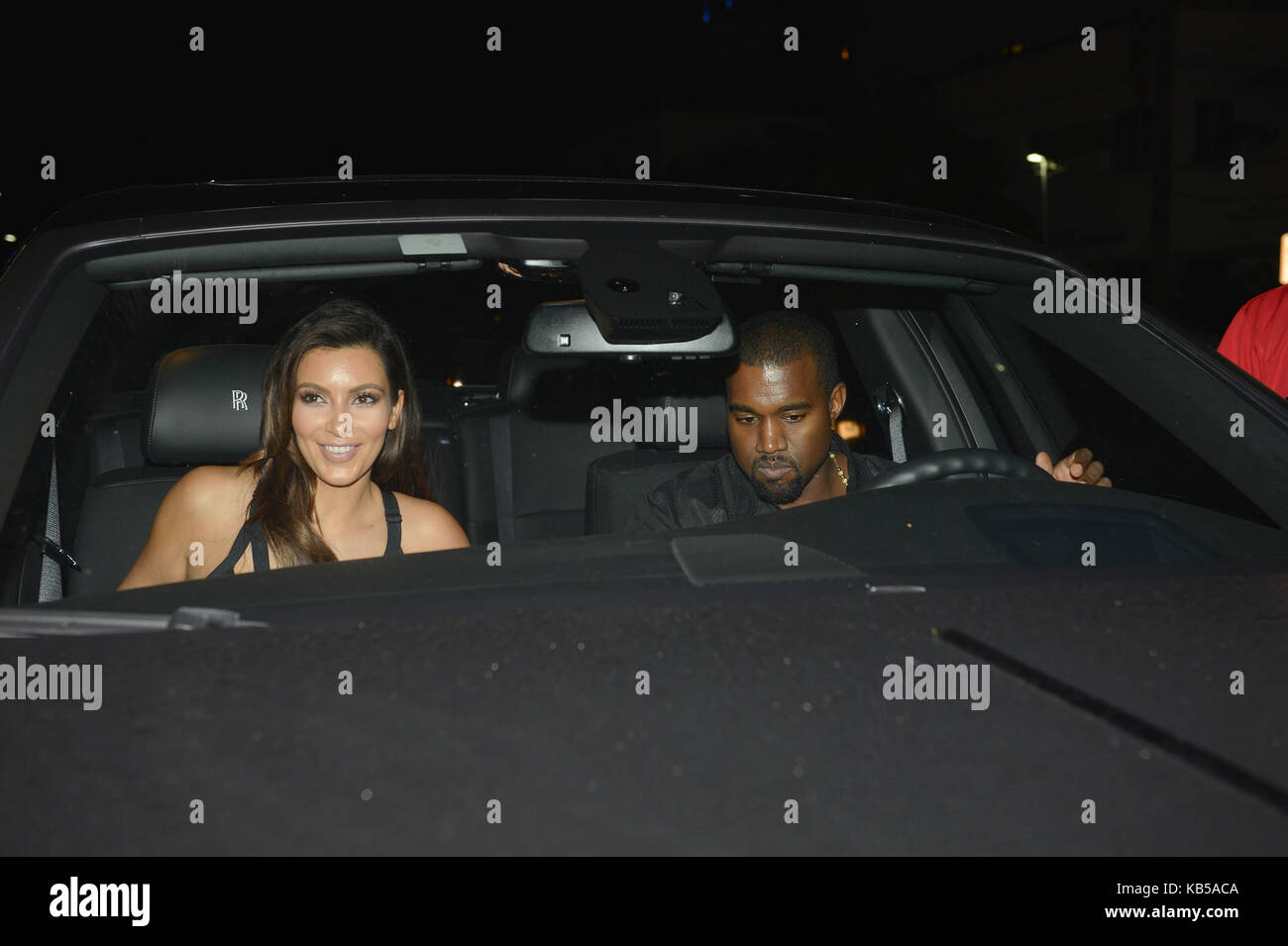 MIAMI BEACH, FL - OCTOBER 14: Kim Kardashian and boyfriend Kanye West ...