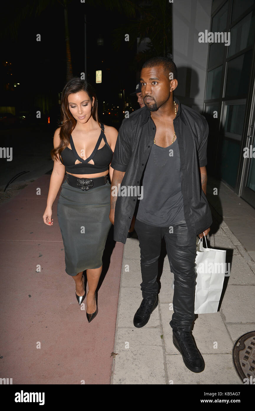 MIAMI BEACH, FL - OCTOBER 14: Kim Kardashian and boyfriend Kanye West ...